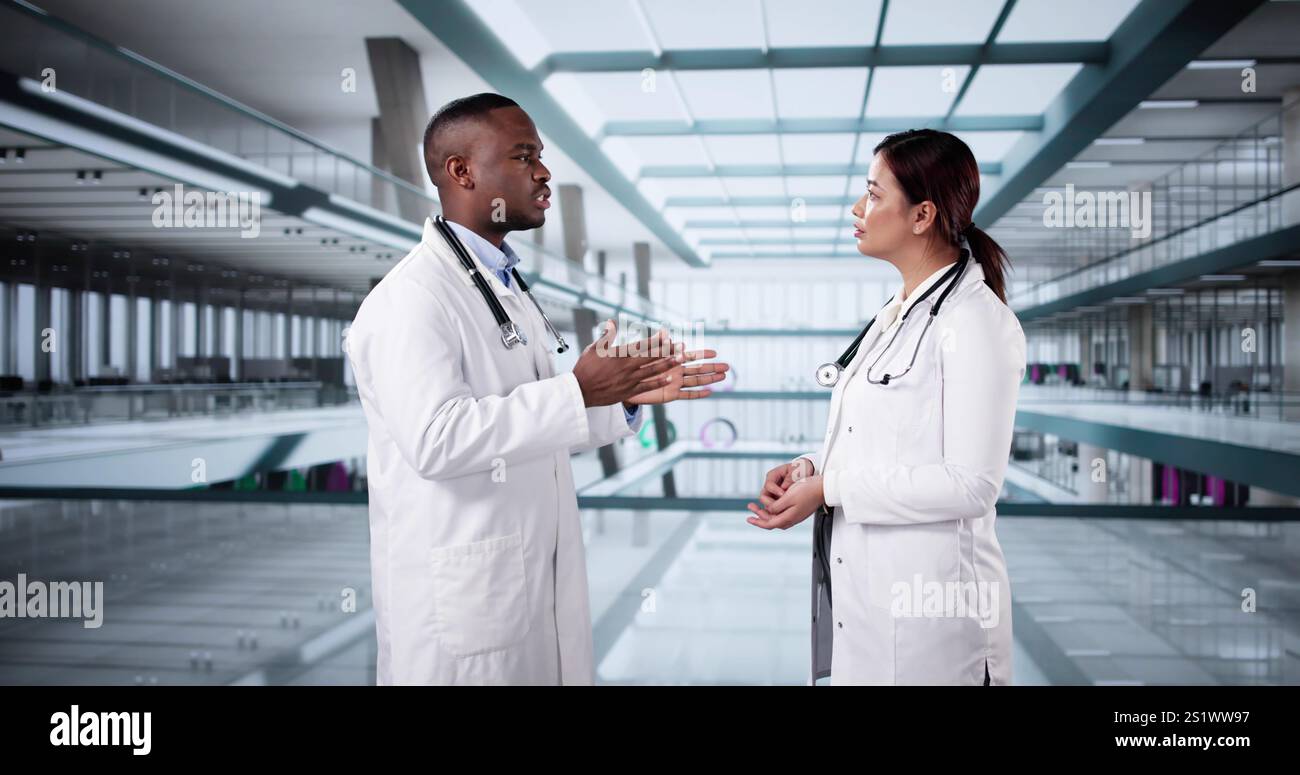 Happy Friendly Doctor Talking In Modern Hospital Stock Photo - Alamy