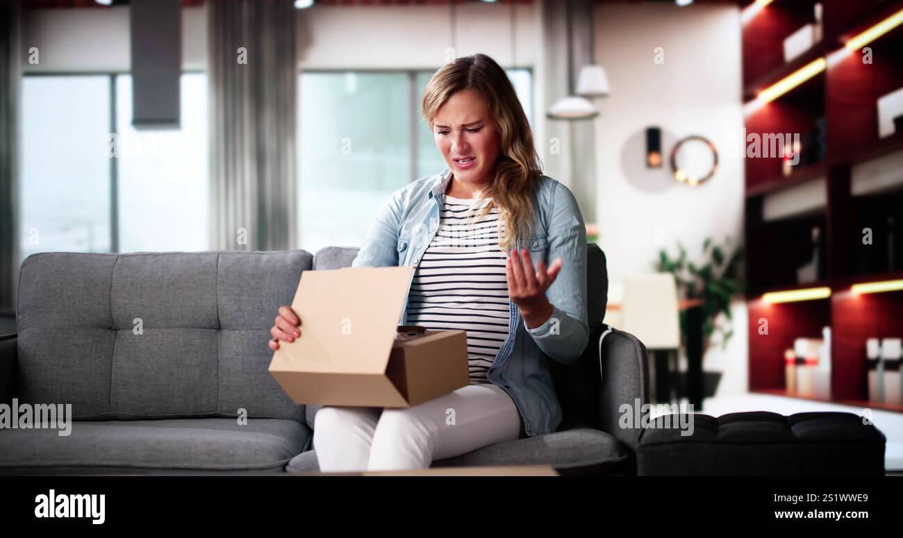 Bad Parcel Box And Sad Woman Shopping At Home Stock Photo - Alamy