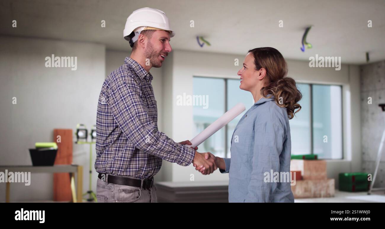 Home Renovation Contractor And Happy Woman Handshake Stock Photo - Alamy