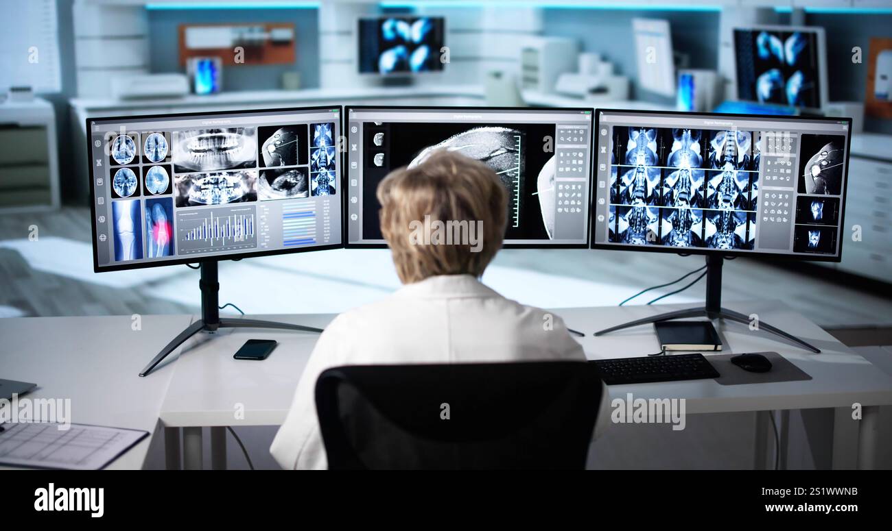 Radiologist Dentist Using X Ray Software On Desktop Computer Stock ...