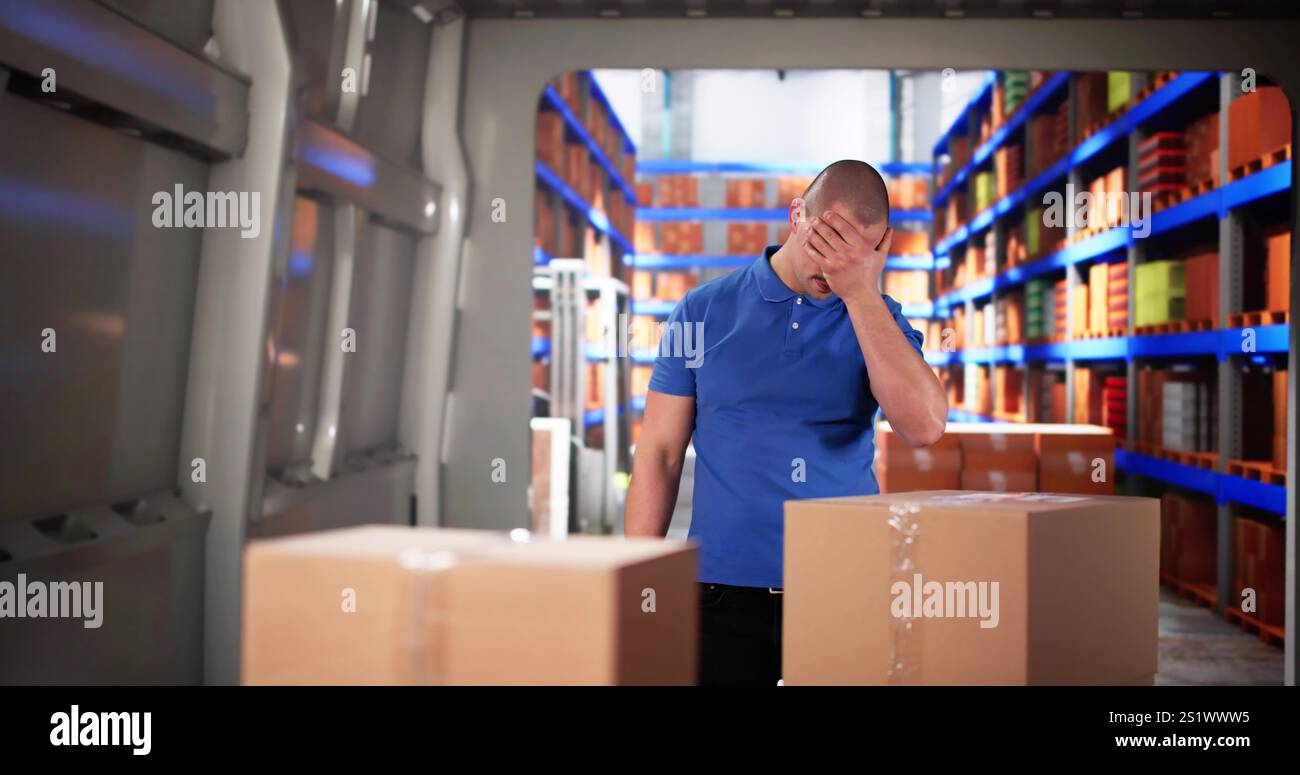 Sad Stressed Delivery Man Loading Van In Warehouse Stock Photo - Alamy