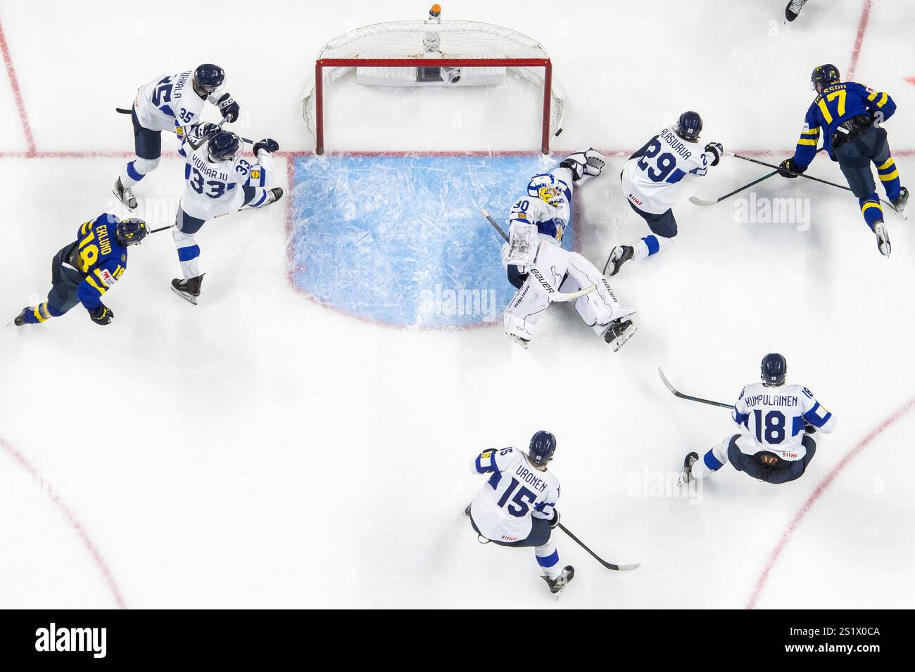 Arttu Tuhkala, Aron Kiviharju, goaltender Petteri Rimpinen, Toumas ...