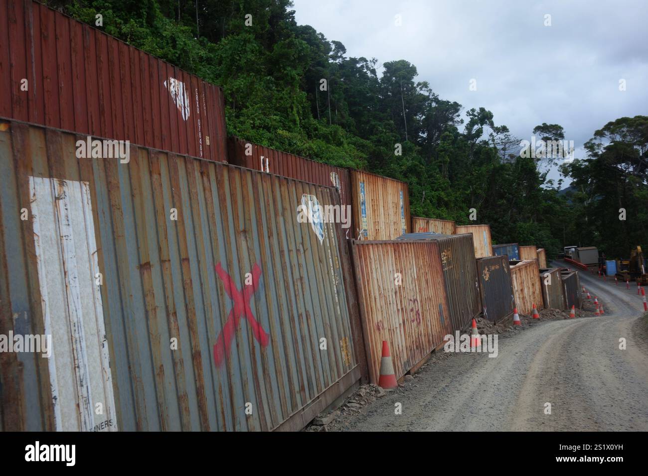 Makeshift repairs to massive landslide caused by Cyclone Jasper, Noah ...