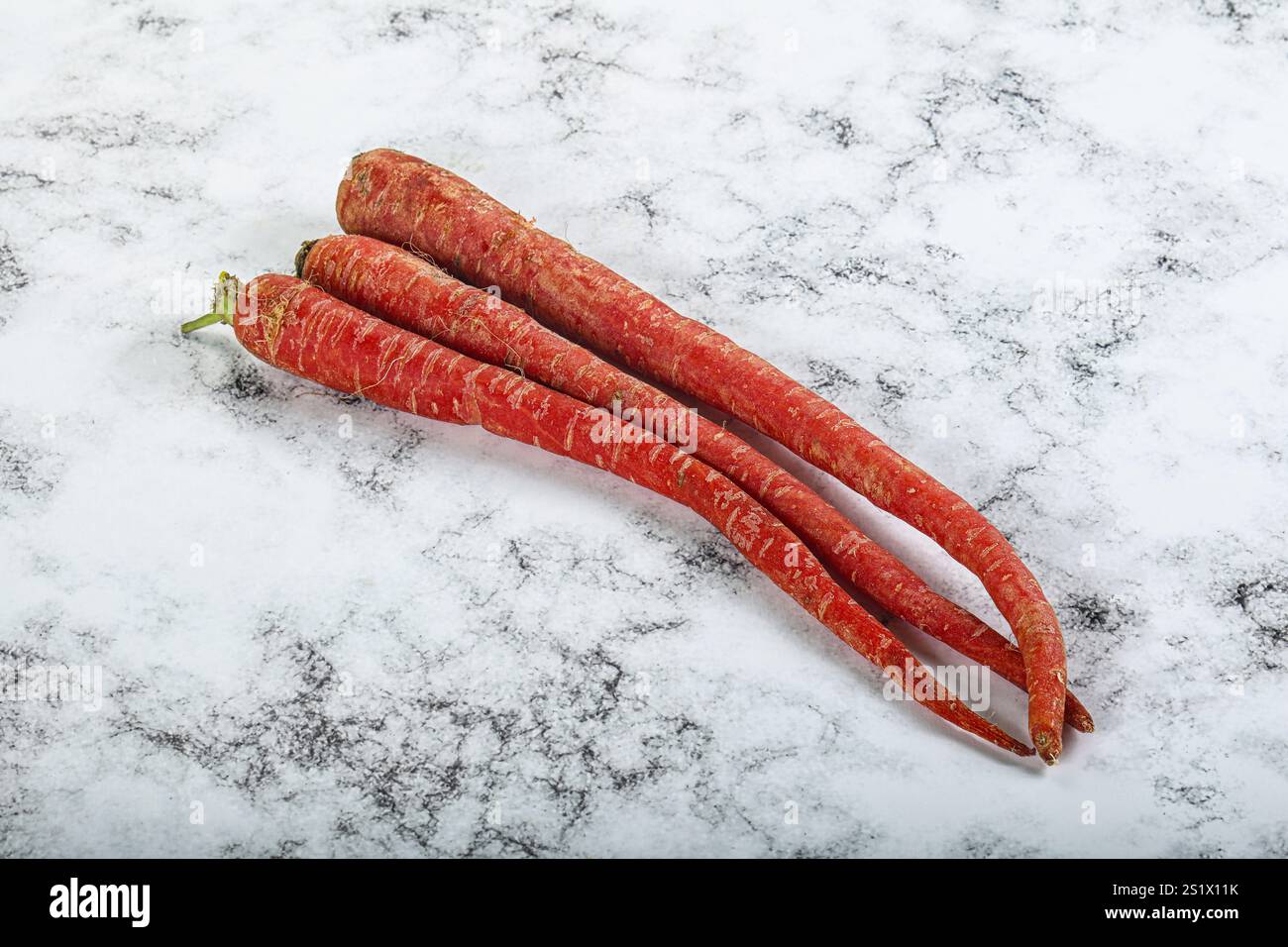 Raw ripe Indian red carrot root Stock Photo - Alamy