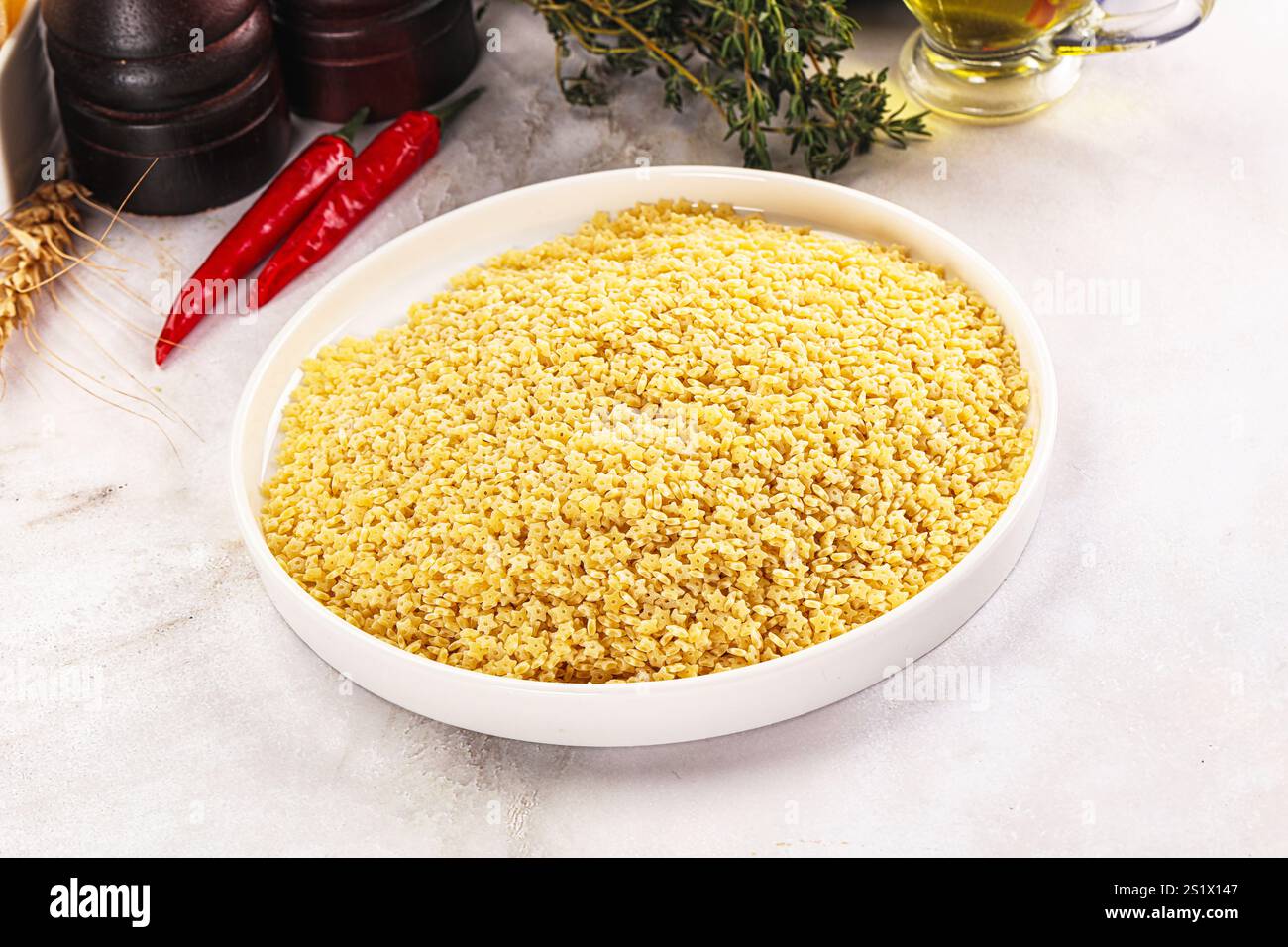 Italian cuisine - dry stelline pasta for bowl Stock Photo - Alamy