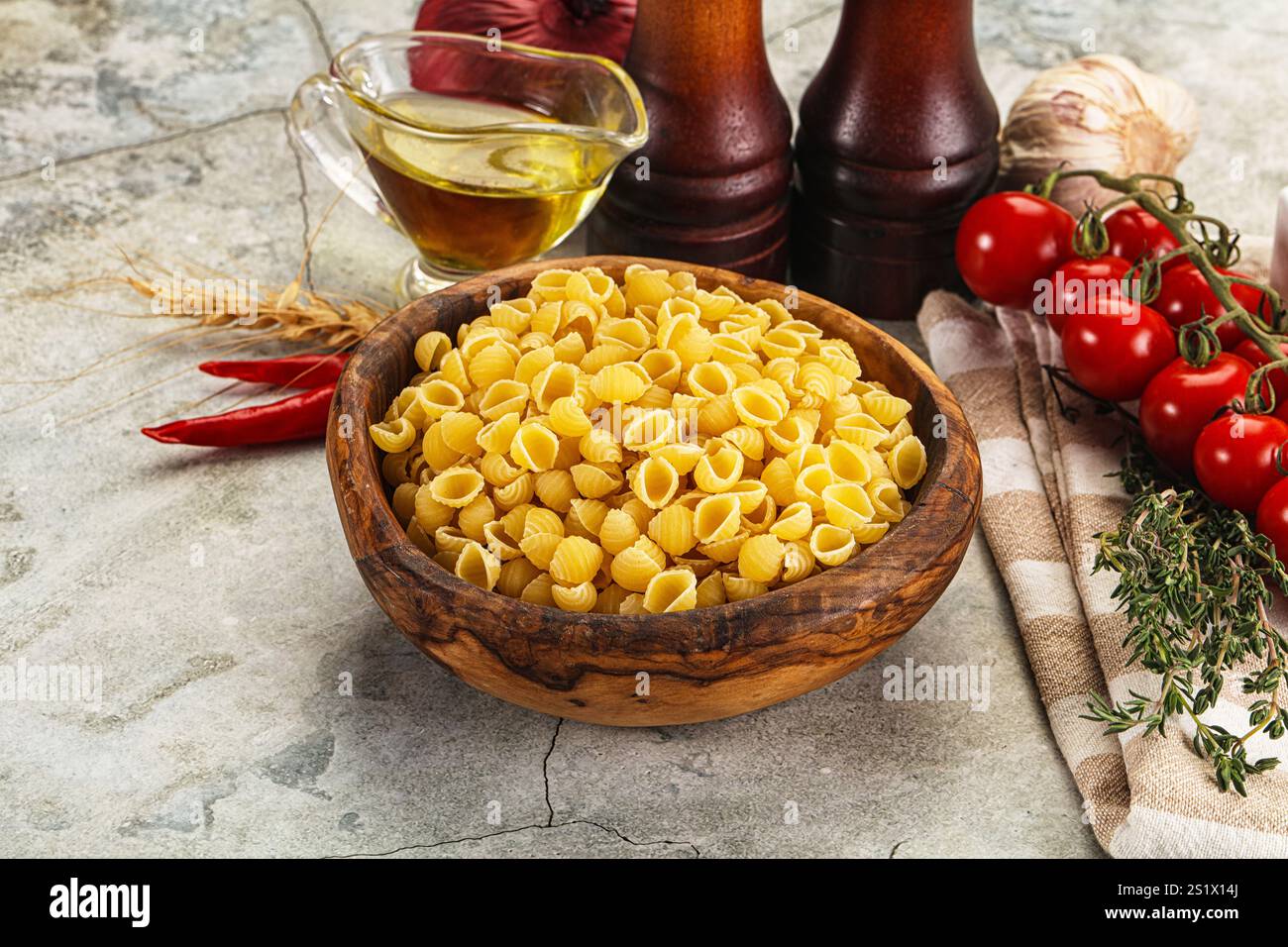Italian cuisine - dry conchiglie shell pasta Stock Photo - Alamy