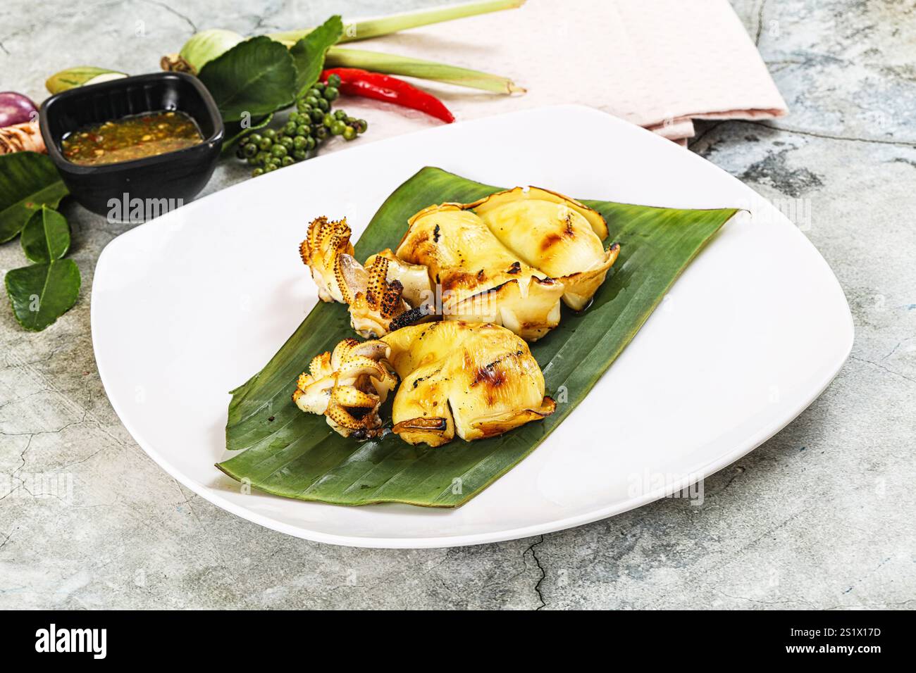 Delicous Grilled cuttlefish with sauce asian style Stock Photo - Alamy