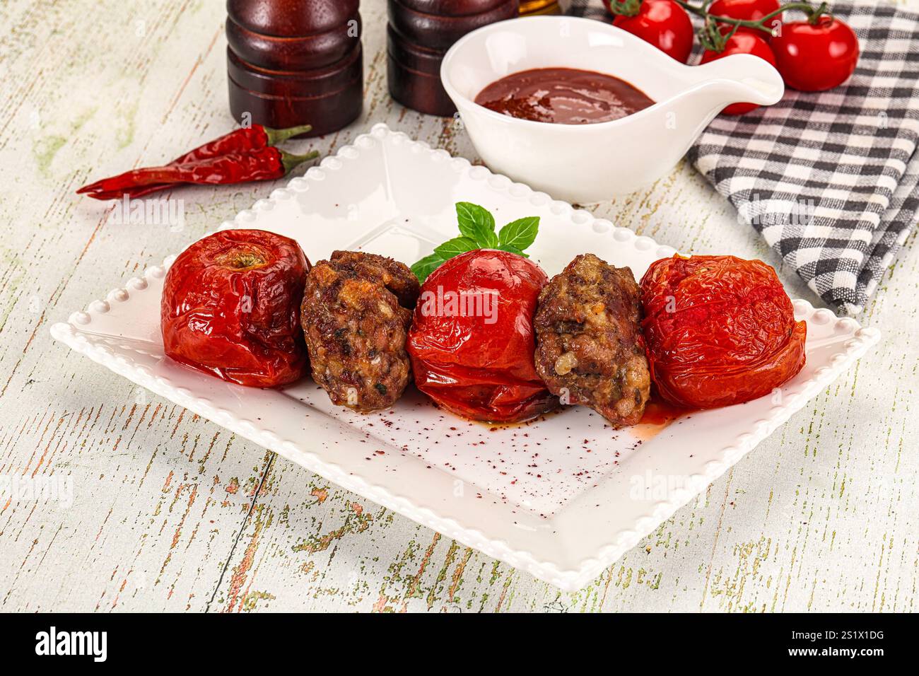 Turkish cuisine - Domatesli Kebab with minced meat and tomato Stock ...