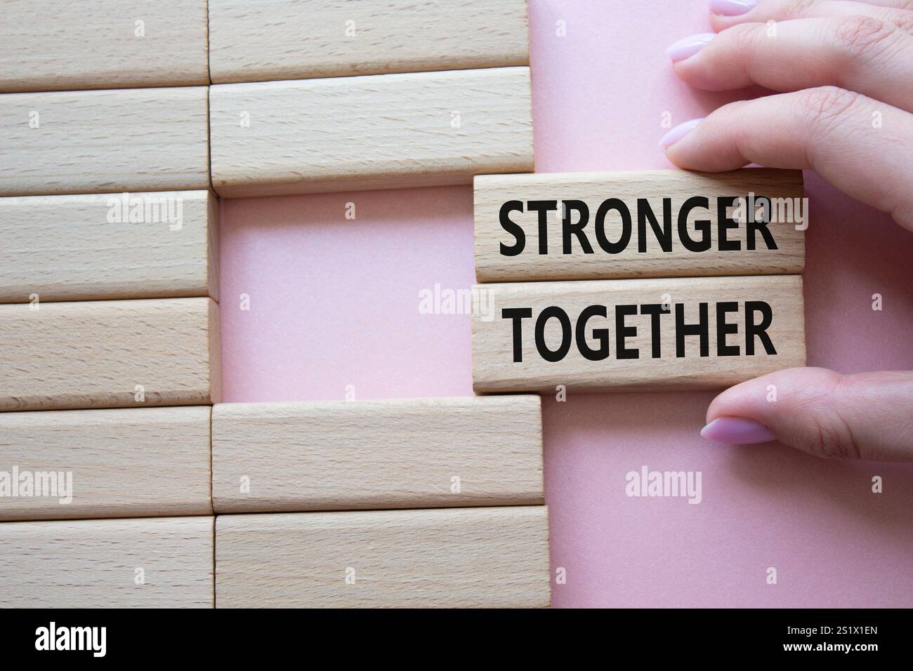 Stronger together symbol. Wooden blocks with words Stronger together ...