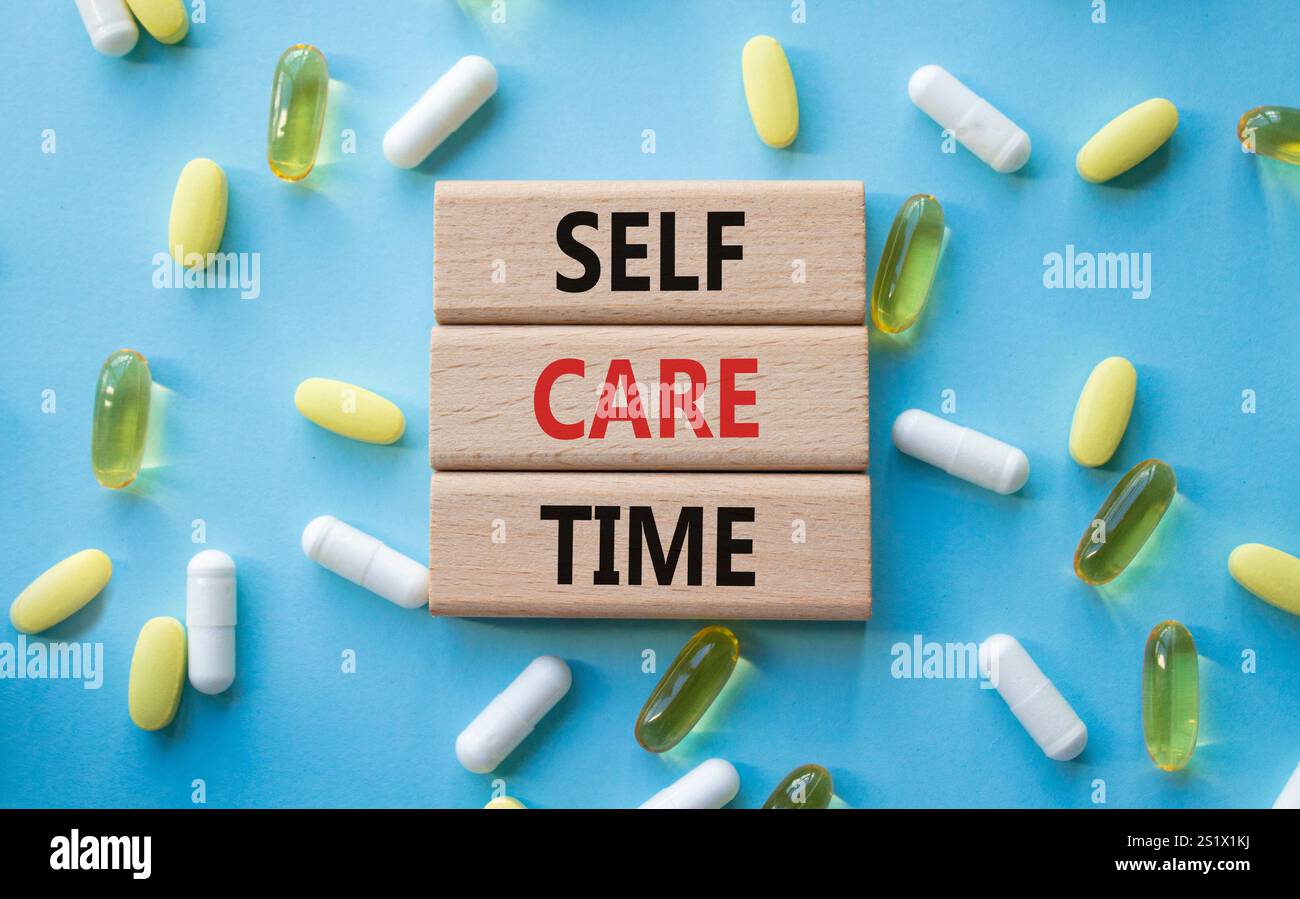 Self-care Time symbol. Concept words Self-care Time on wooden blocks ...