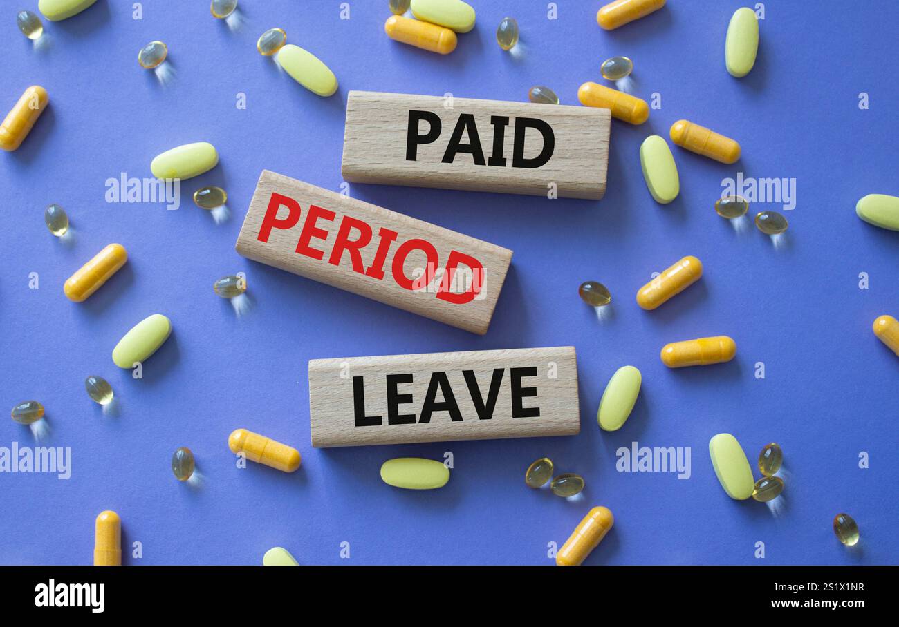 Paid Period Leave symbol. Concept words Paid Period Leave on wooden ...