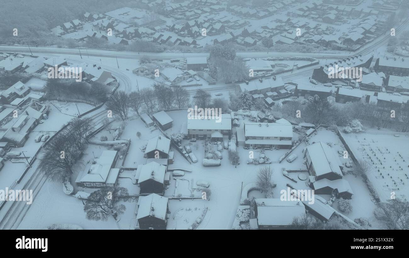 Barnsley, UK. 05th Jan, 2025. Heavy Snow falls in the village of Monk ...