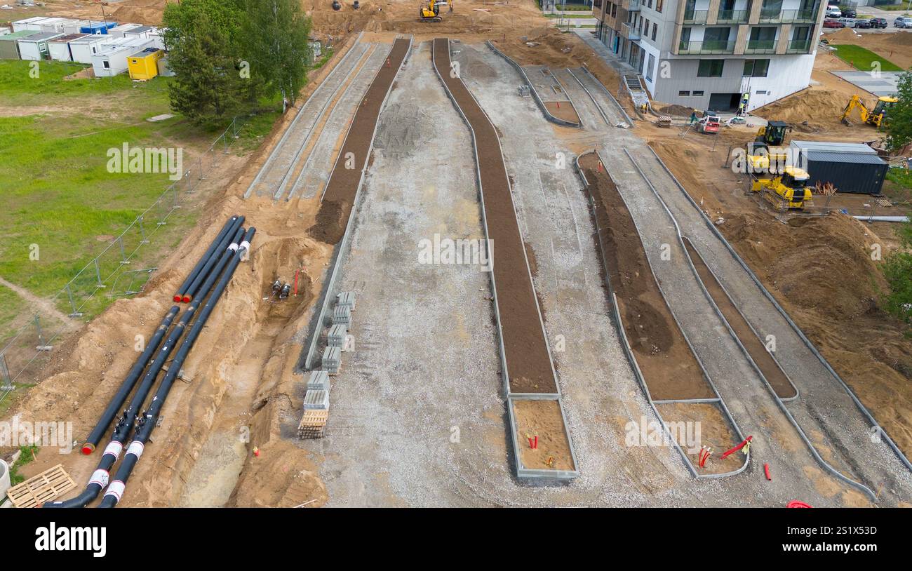 Aerial view of a construction site with groundwork and infrastructure ...