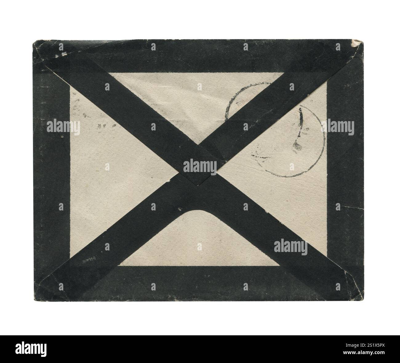 front view of old closed aged paper envelope with faded stamp print and ...