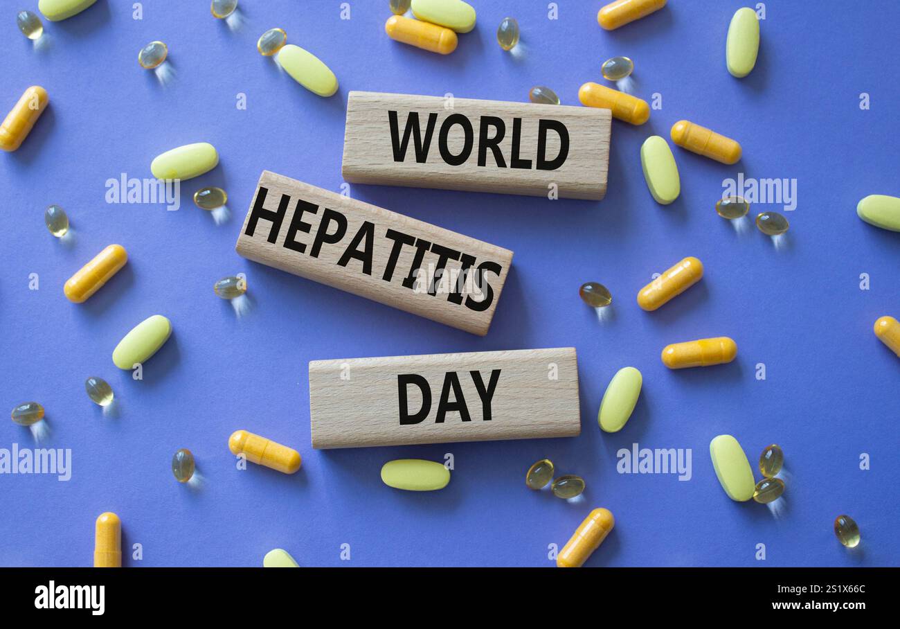 World Hepatitis Day symbol. Concept words World Hepatitis Day on wooden ...
