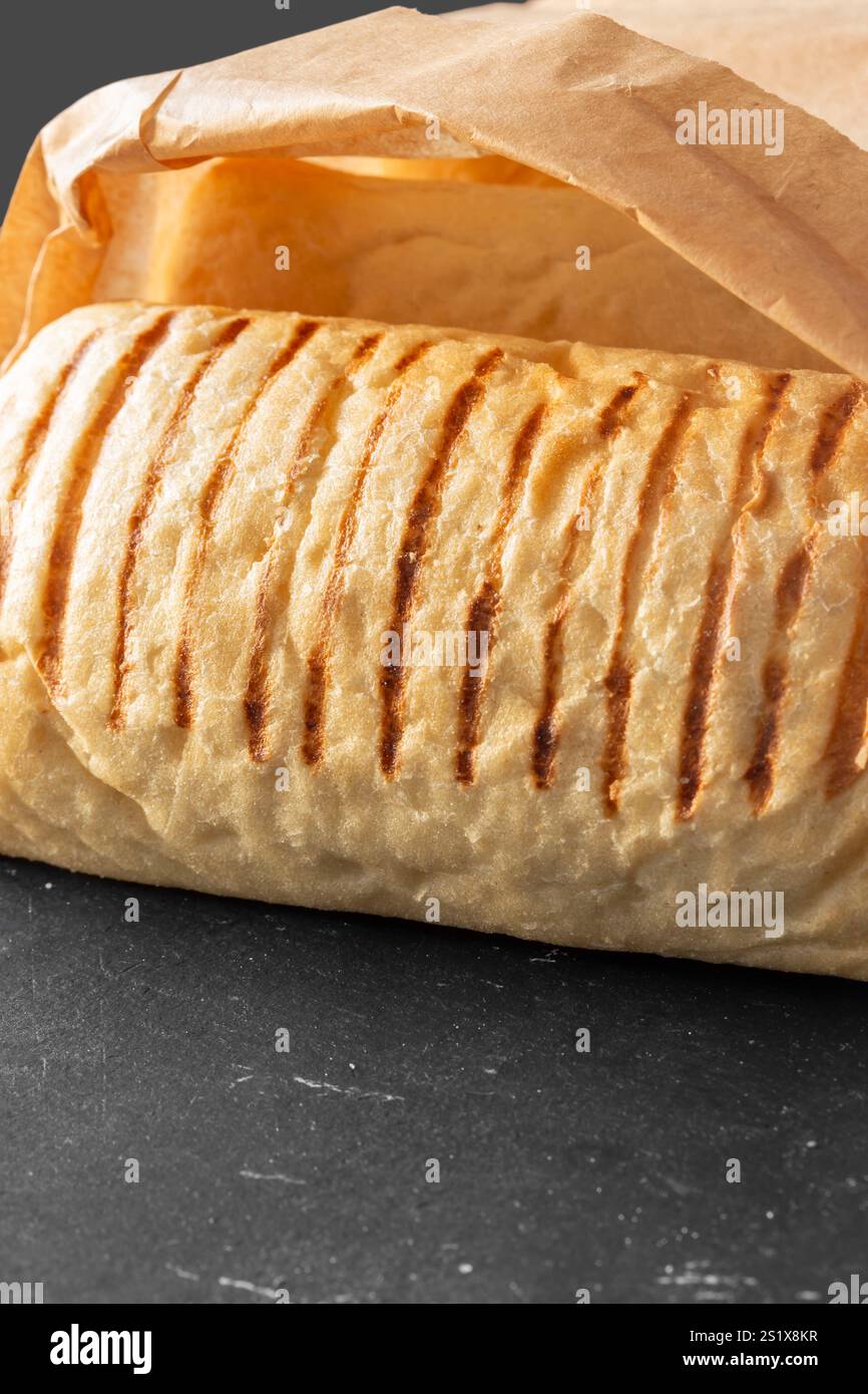 Panini bread in a brown paper bag. Eco friendly recycle disposable ...
