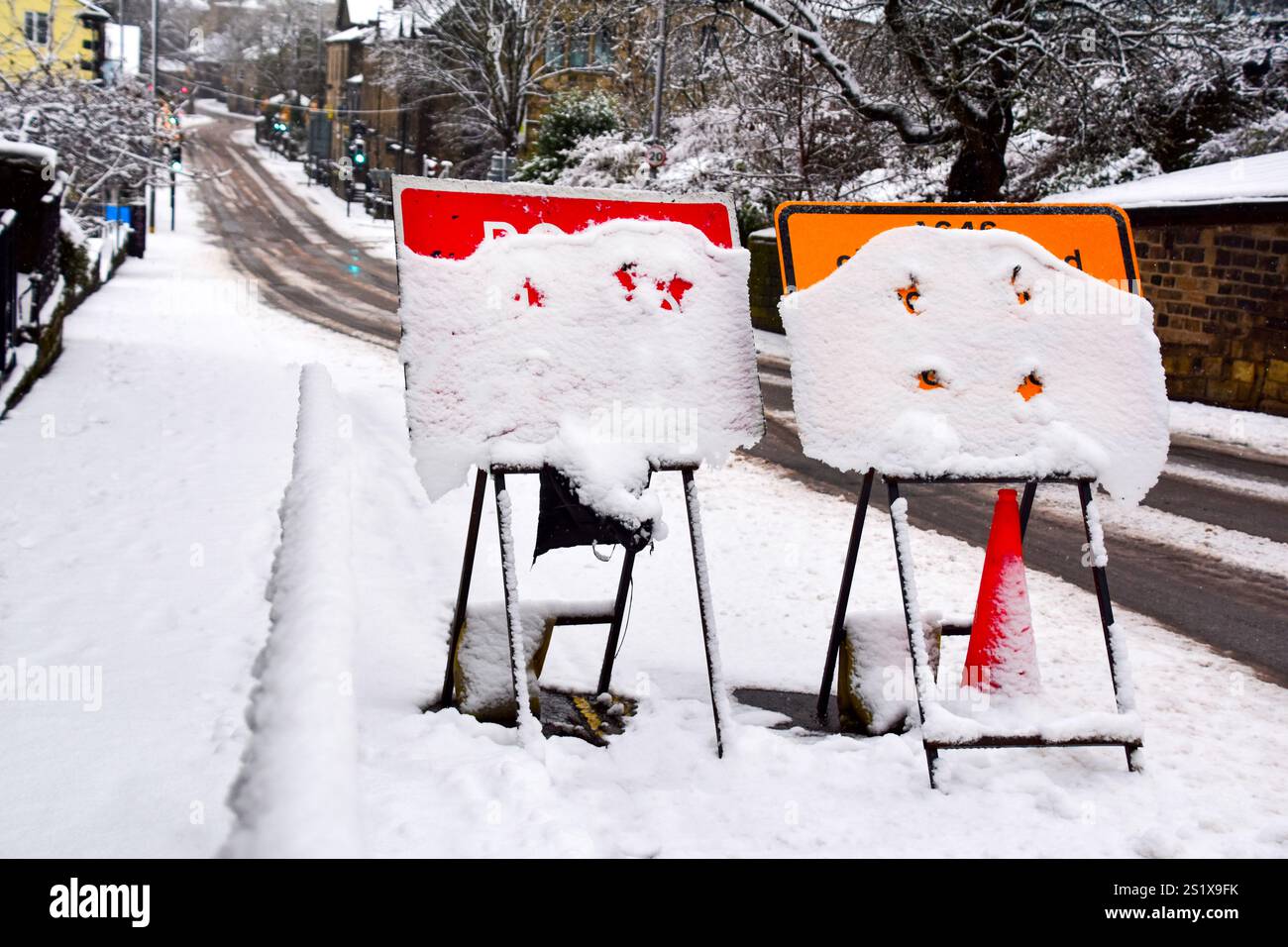 Snow on road traffic signs, Hebden Bridge, Calderdale Stock Photo - Alamy