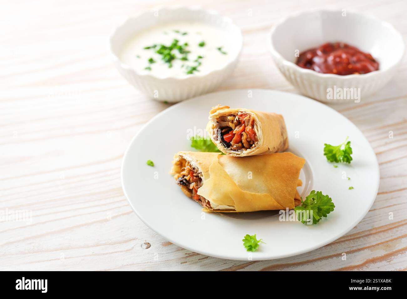 Spring rolls from crispy filo pastry stuffed with spicy vegetables ...
