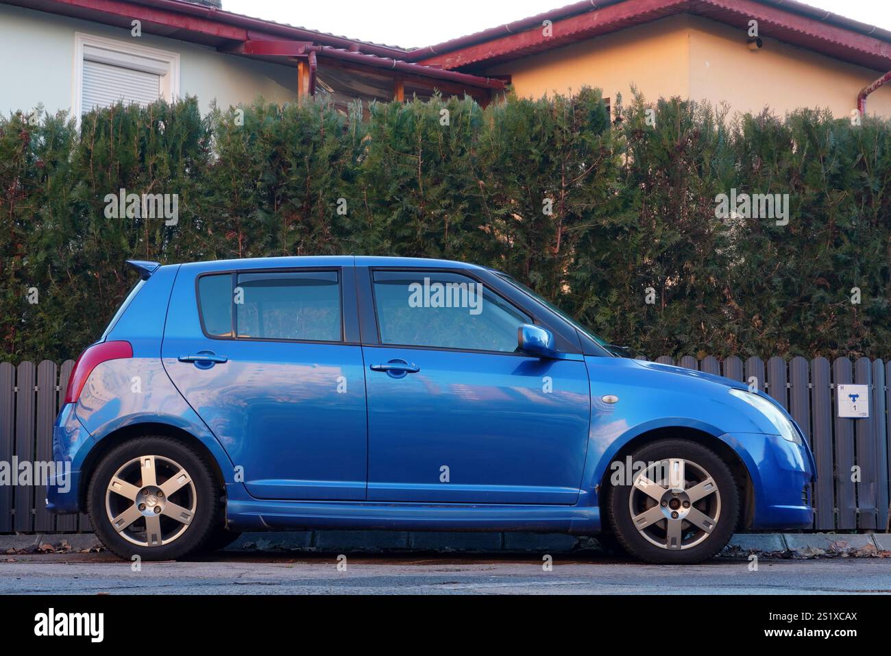 Bucharest, Romania – January 4, 2025: Side view of Suzuki Swift blue ...