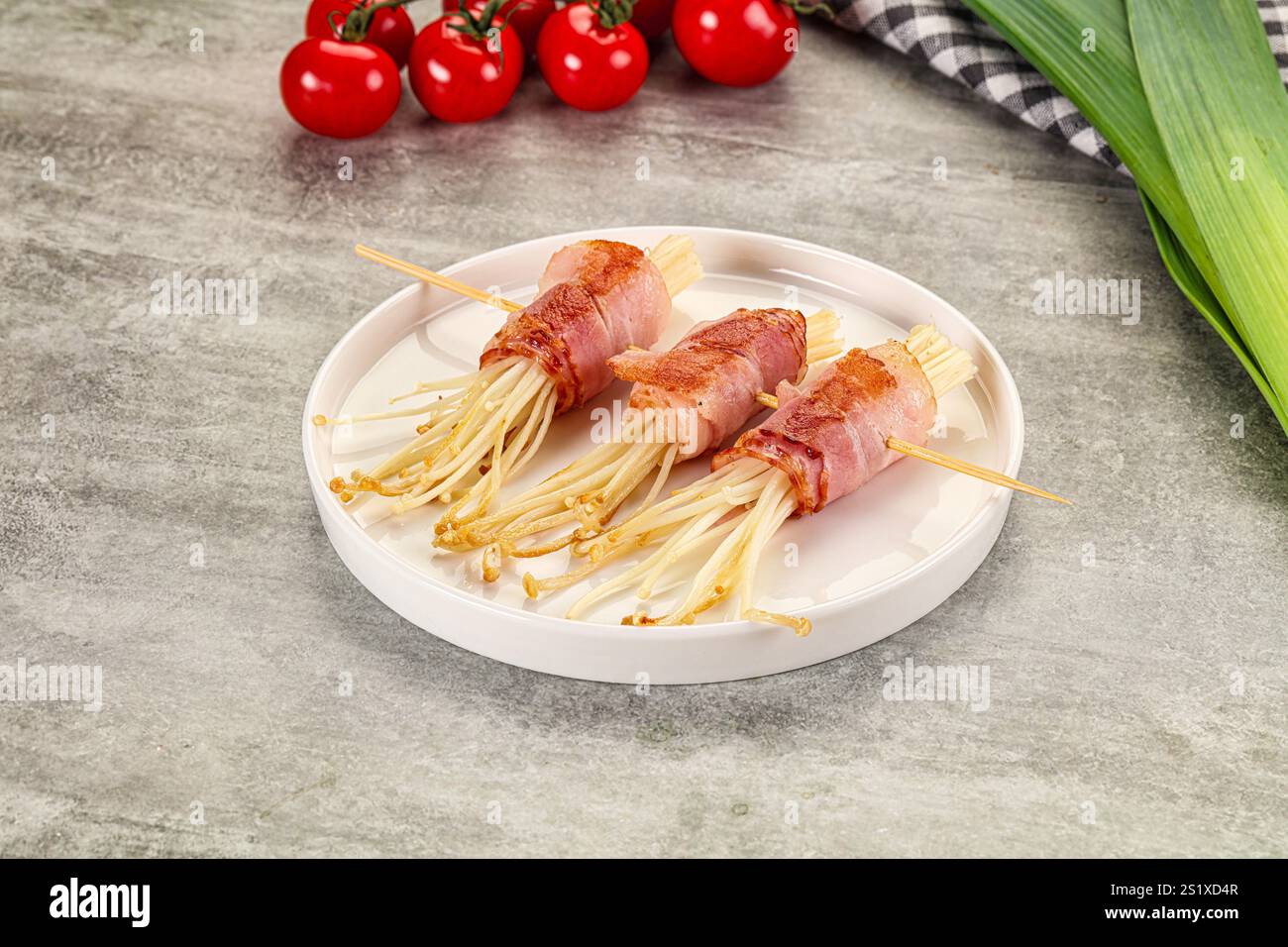 Grilled enoki mushroom with bacon roll wrap Stock Photo - Alamy