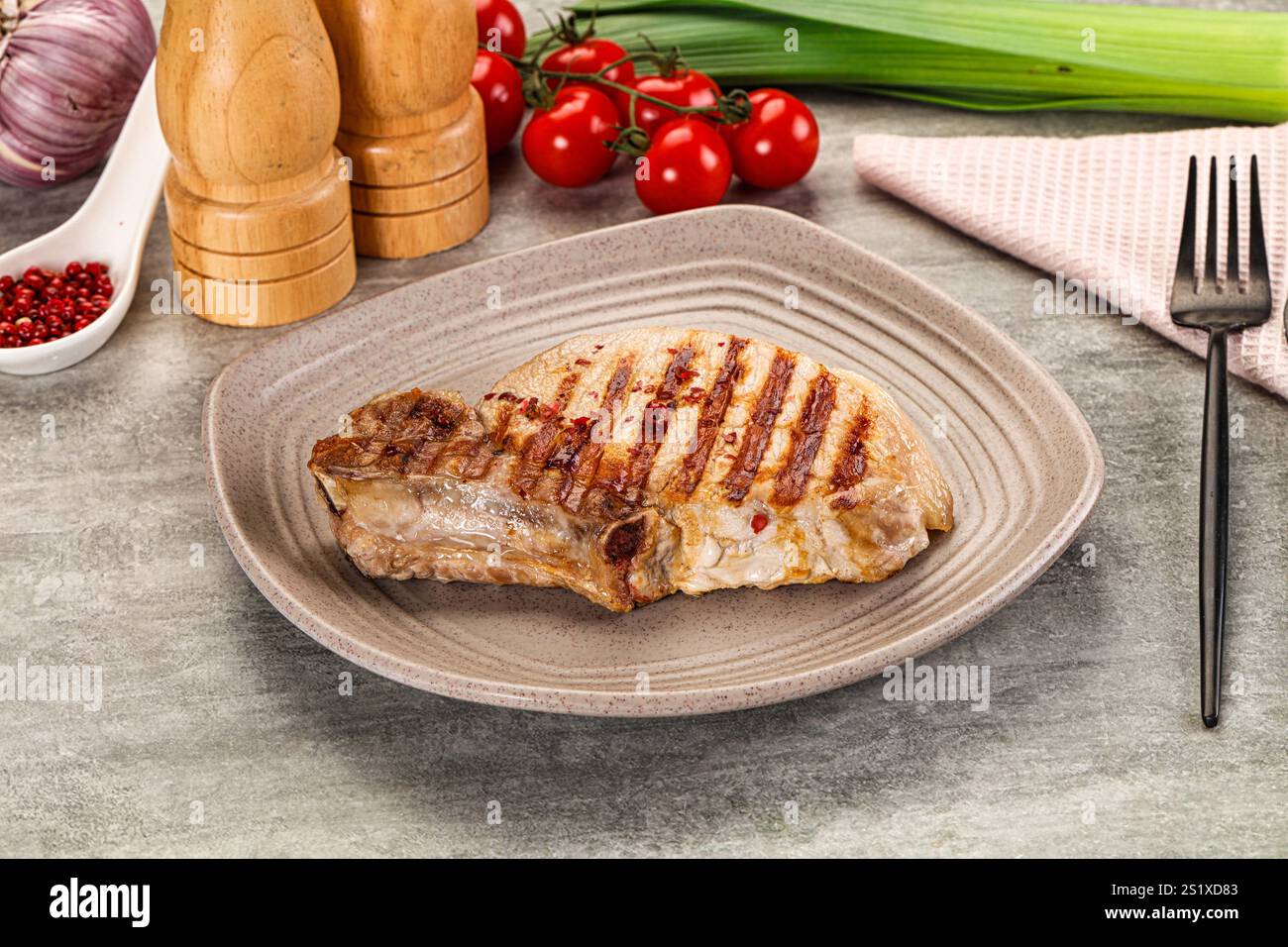 Grilled fat pork loin steak with bone Stock Photo - Alamy