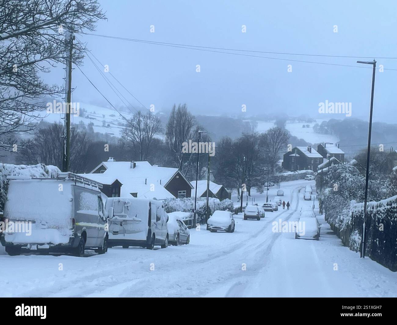 BEST QUALITY AVAILABLE People walk in the snow in Loxley, Sheffield ...