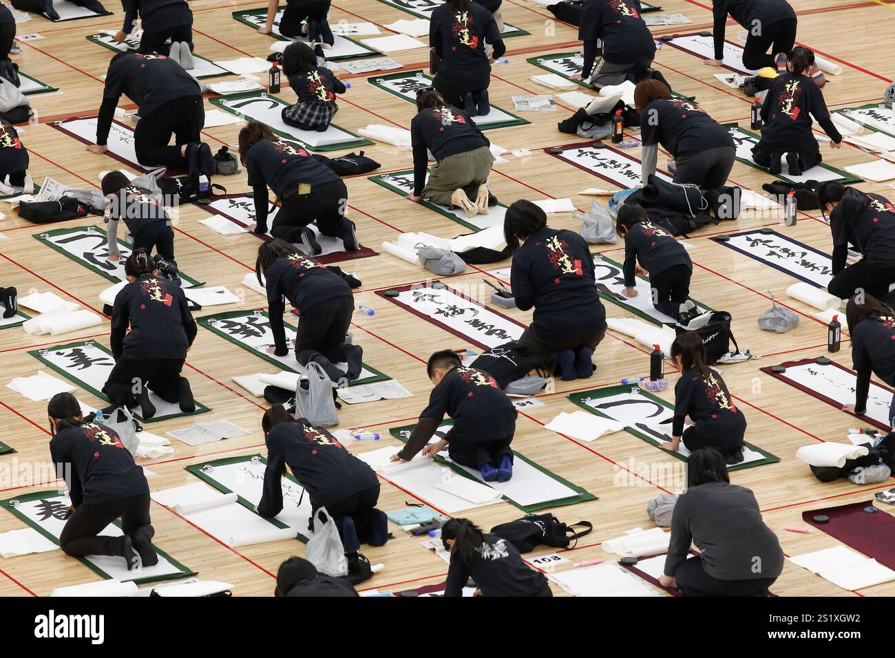 Participants write characters during the annual Kakizome (first ...