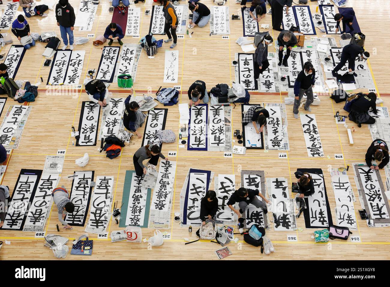 Participants write characters during the annual Kakizome (first ...