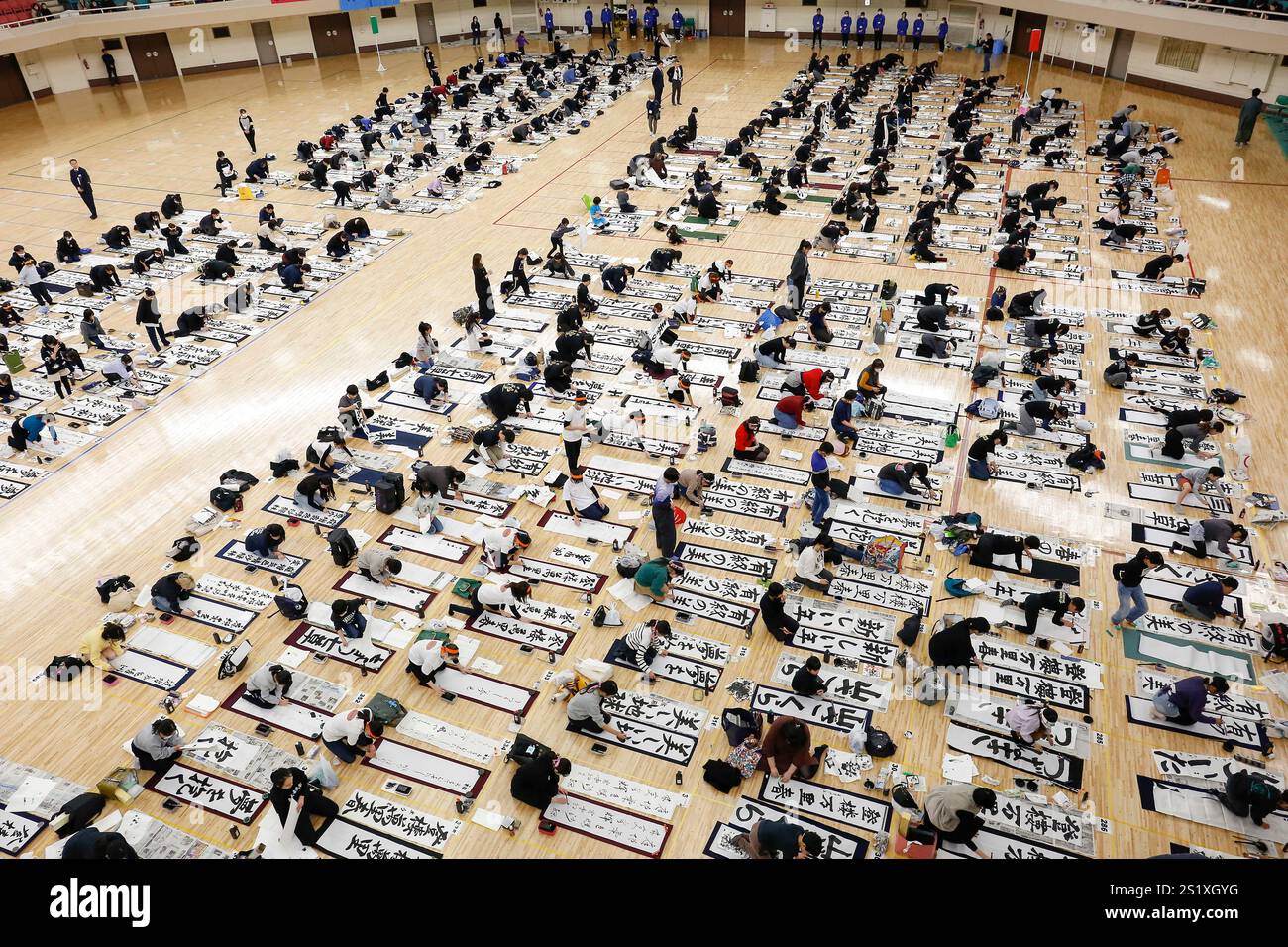 Participants write characters during the annual Kakizome (first ...
