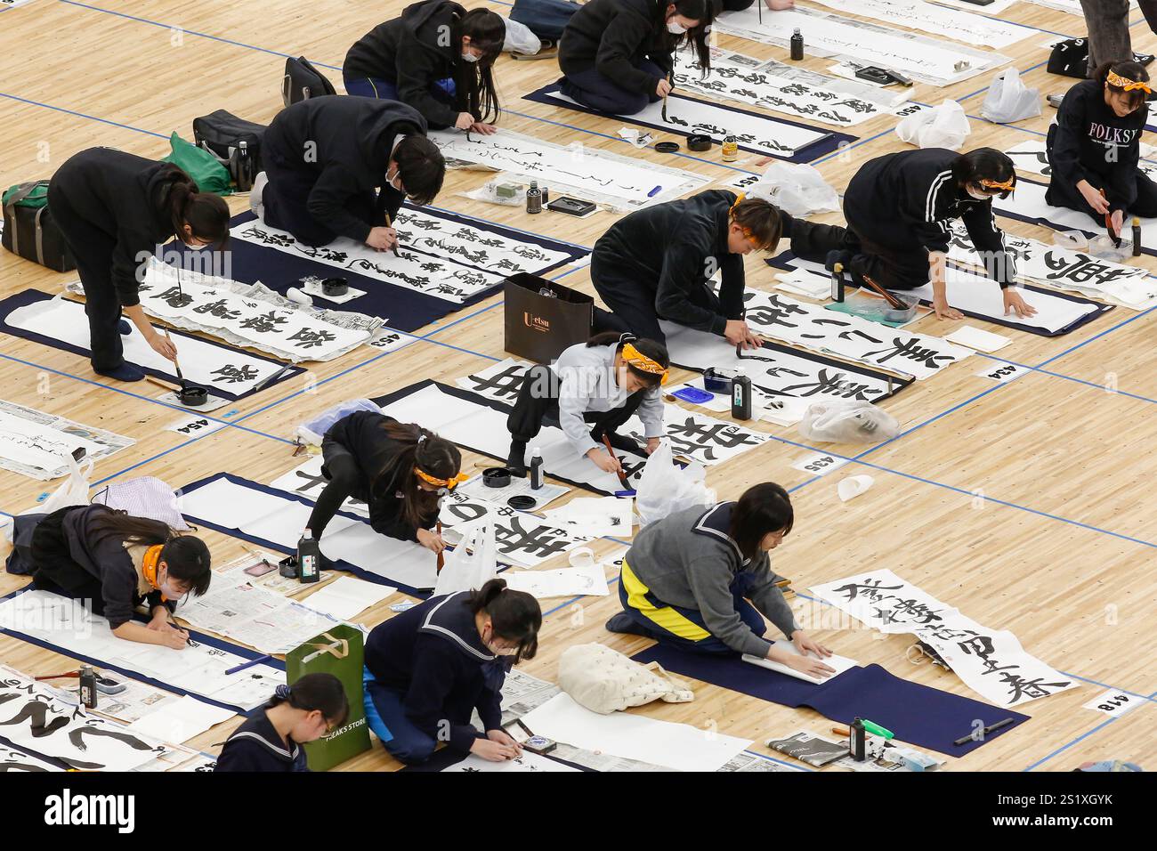 Participants write characters during the annual Kakizome (first ...