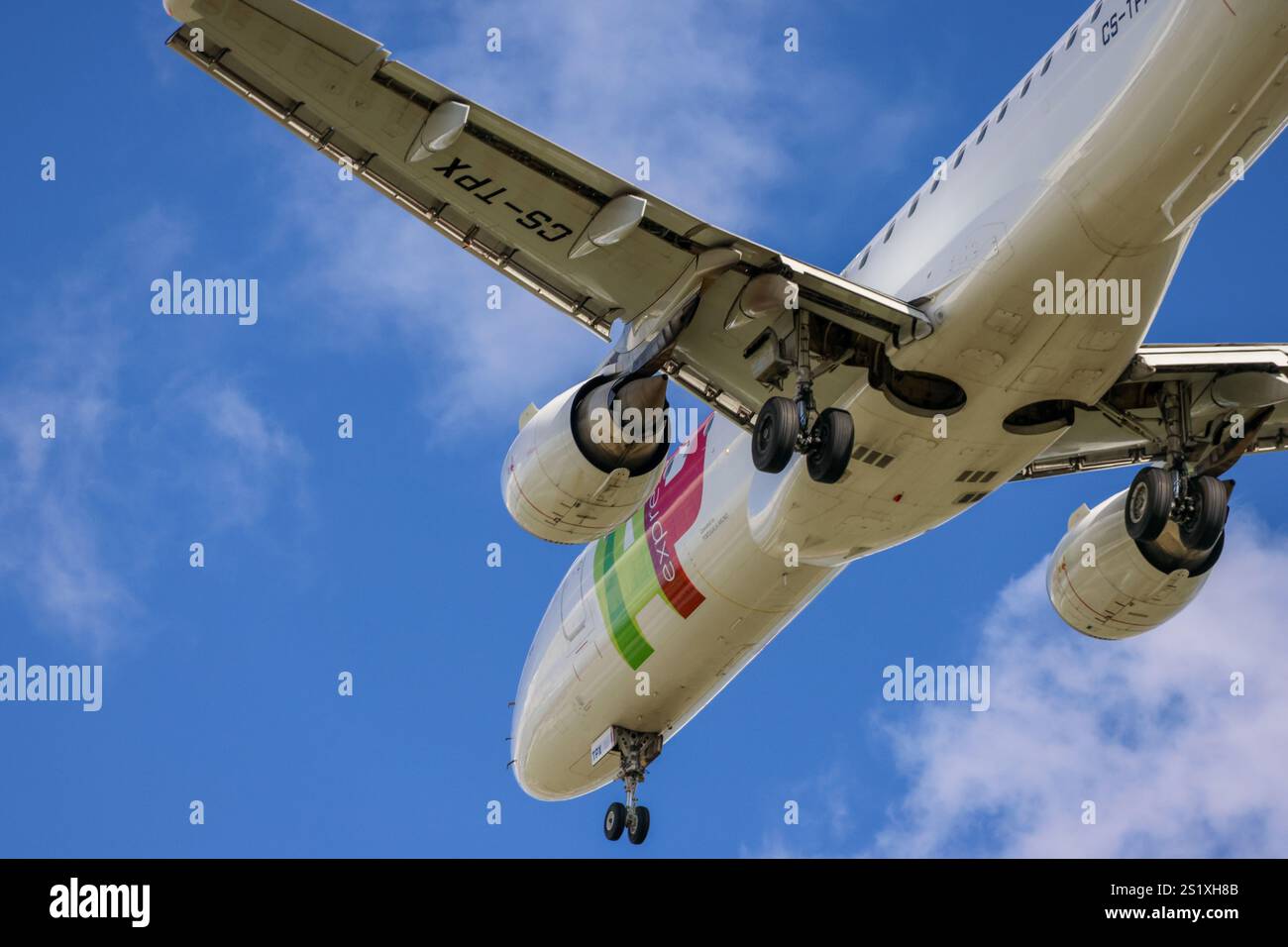 Airplane approaching runway with landing gear extended, ready for ...