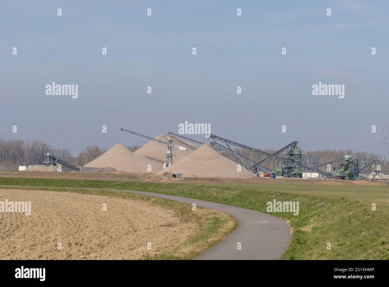 A rural industrial scene in Bobenheim-Roxheim, Germany, featuring large ...