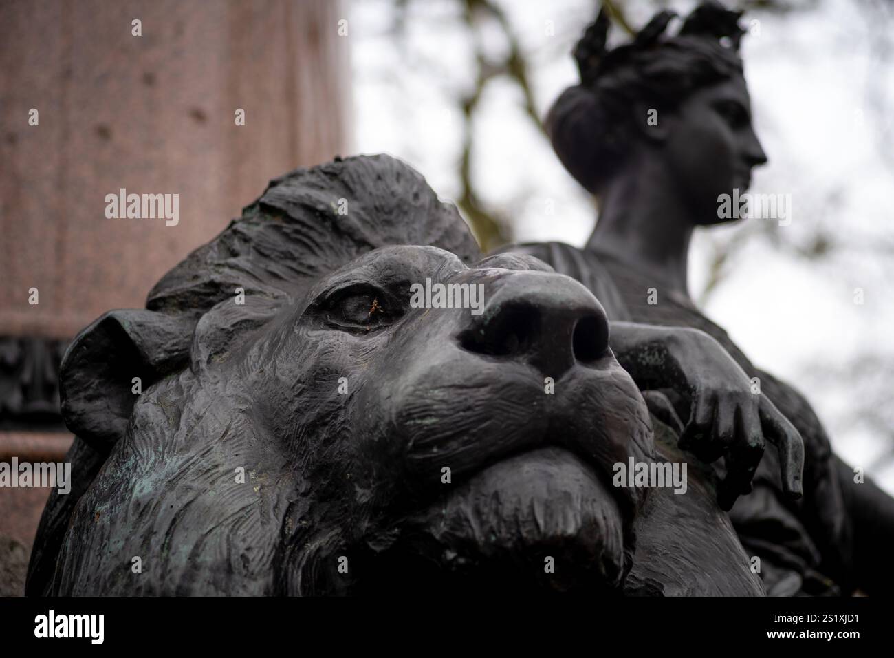 Life-size allegorical statue of Britannia lounging on a reclining lion ...