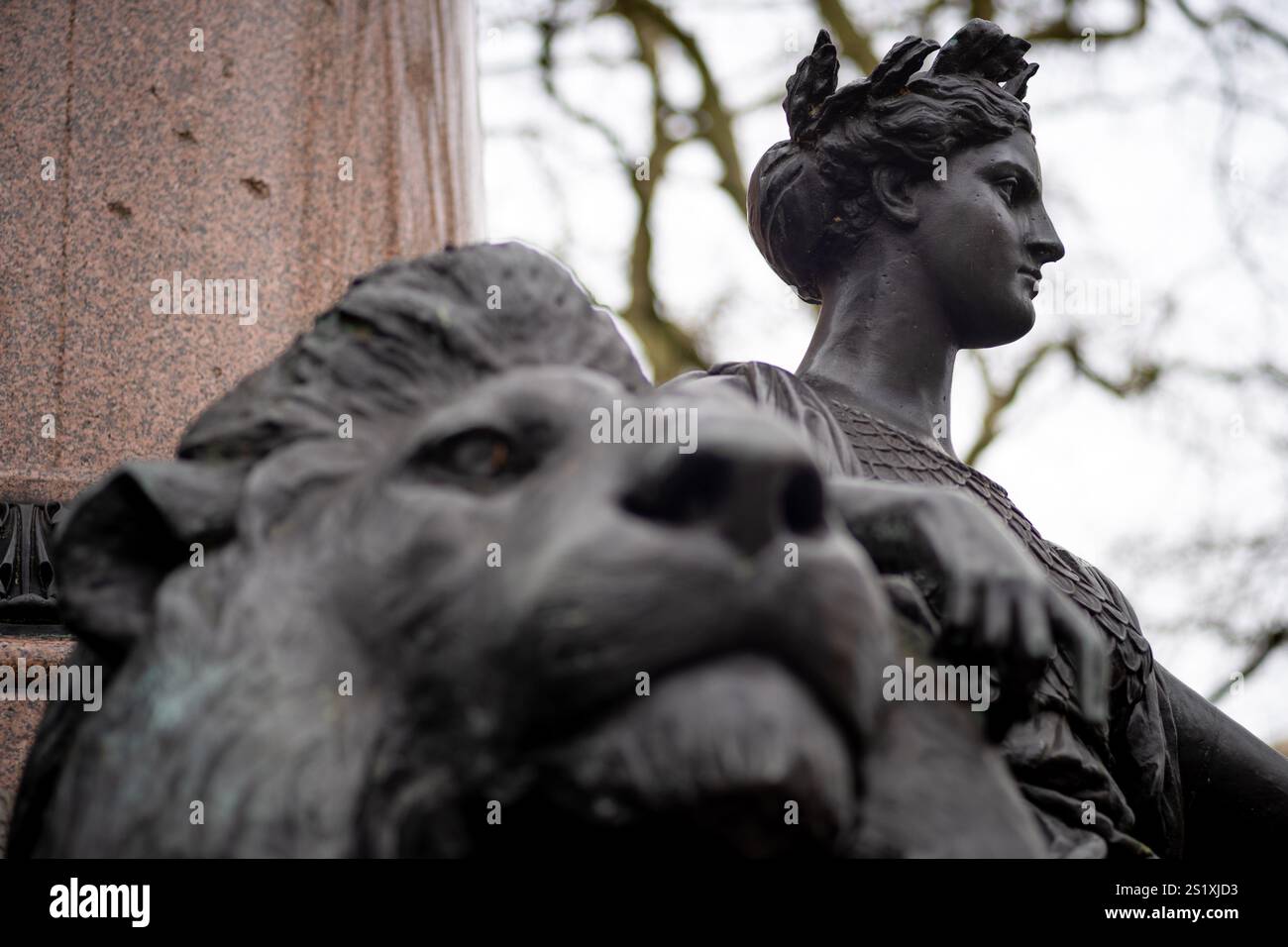 Life-size allegorical statue of Britannia lounging on a reclining lion ...