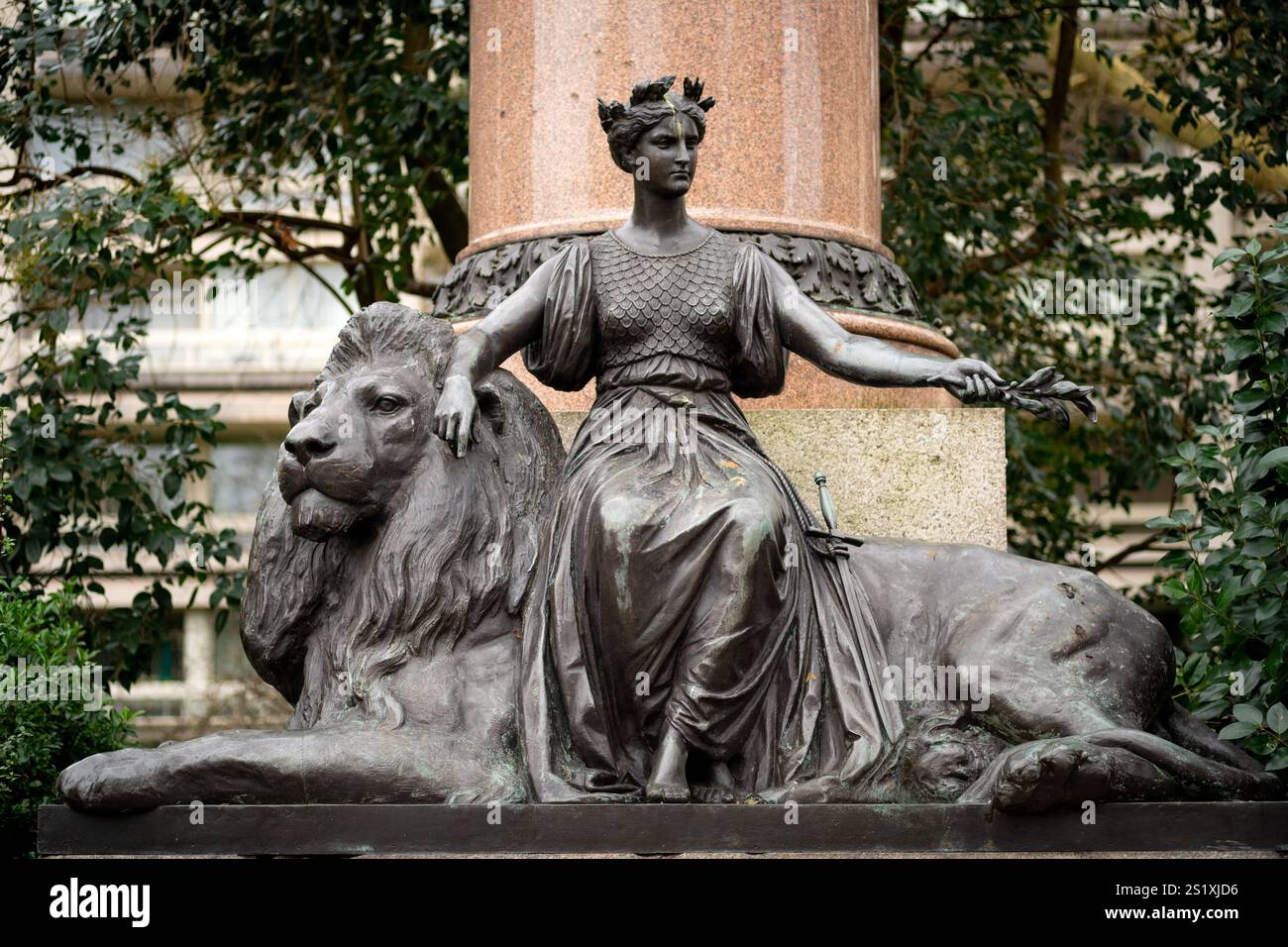 Life-size allegorical statue of Britannia lounging on a reclining lion ...