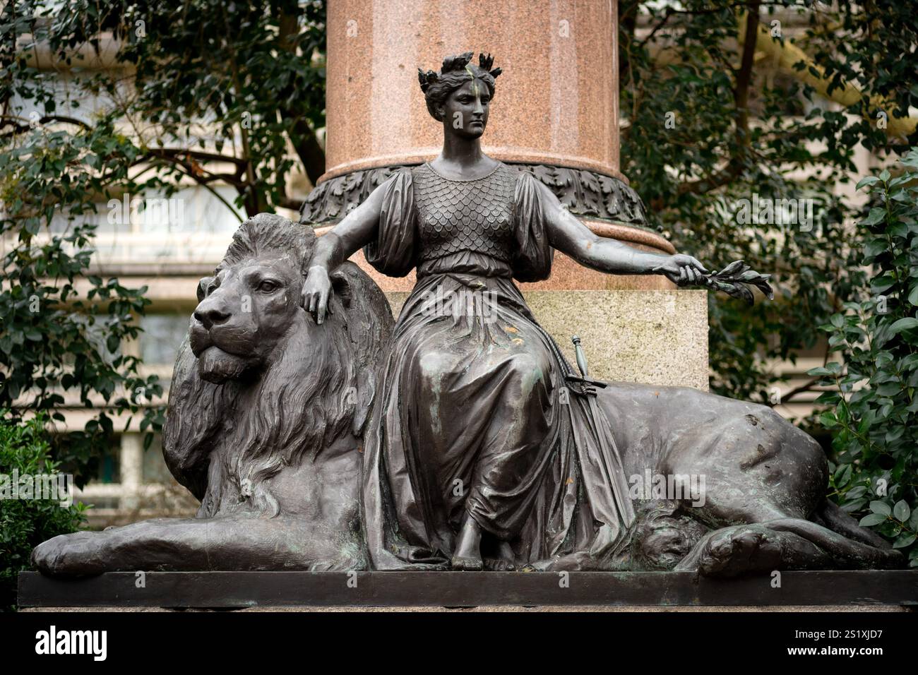 Life-size allegorical statue of Britannia lounging on a reclining lion ...