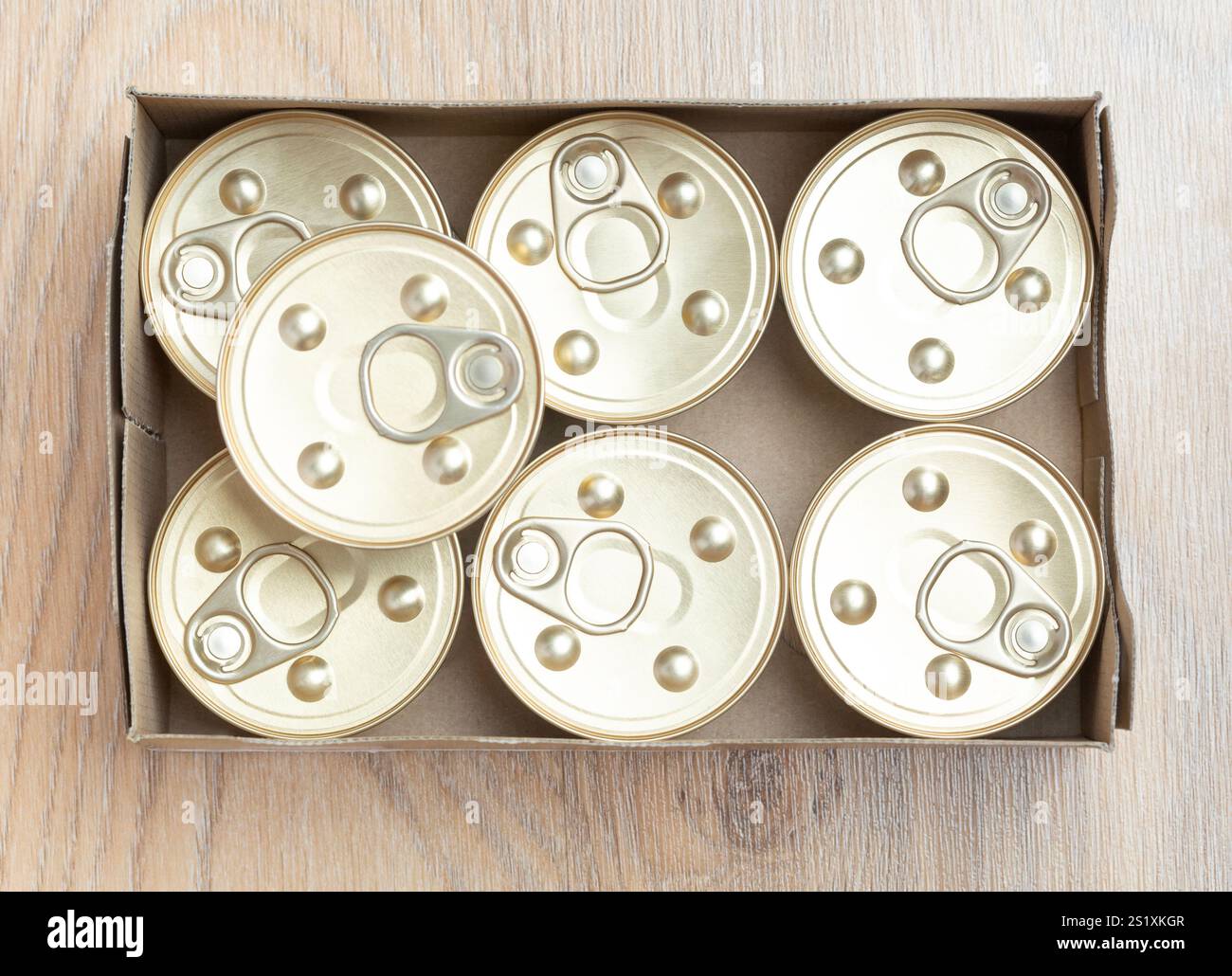 Many unopened aluminum cans of cat food in a cardboard box. Creative ...