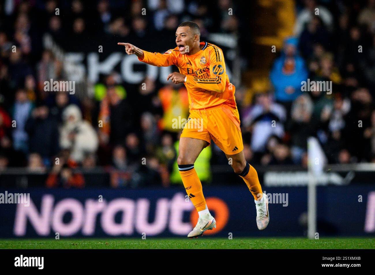 Real Madrid's French player Kylian Mbappé running dedicating a goal by ...