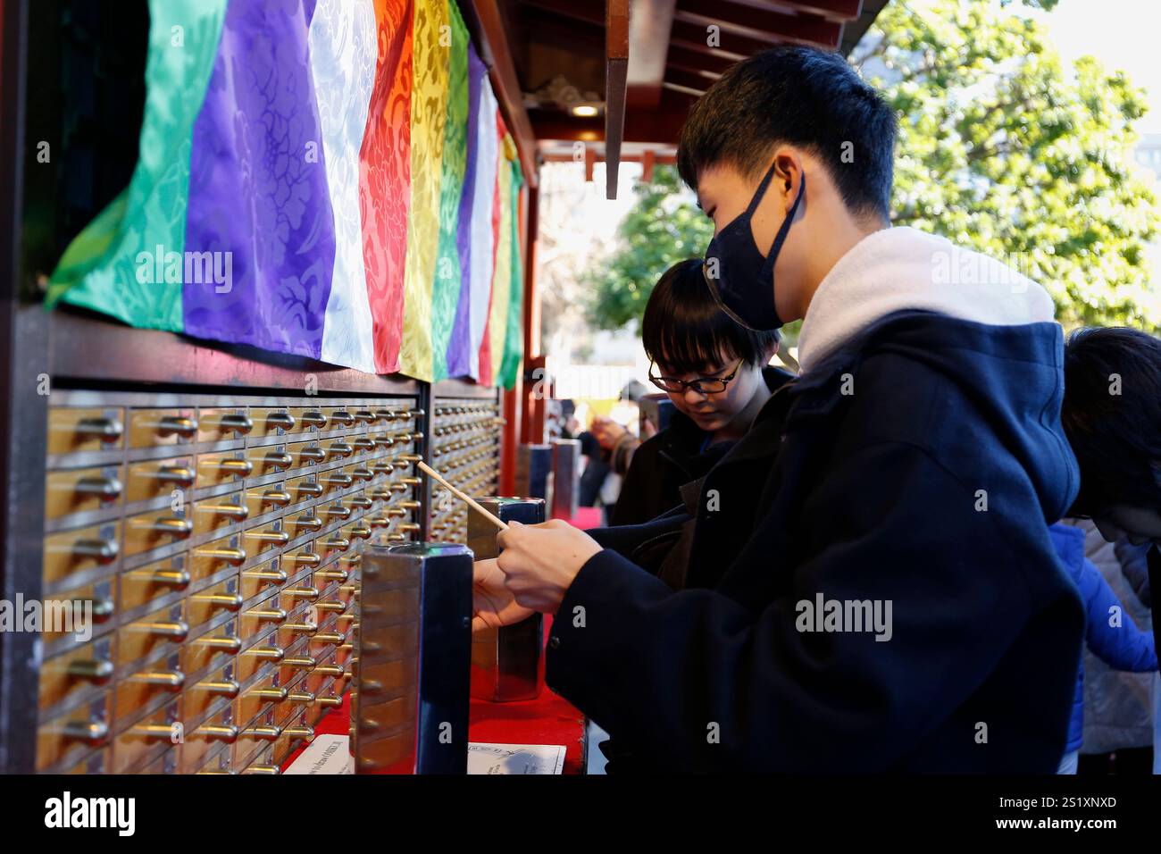 People visit the Sensoji Temple in Asakusa to pray for good luck on ...