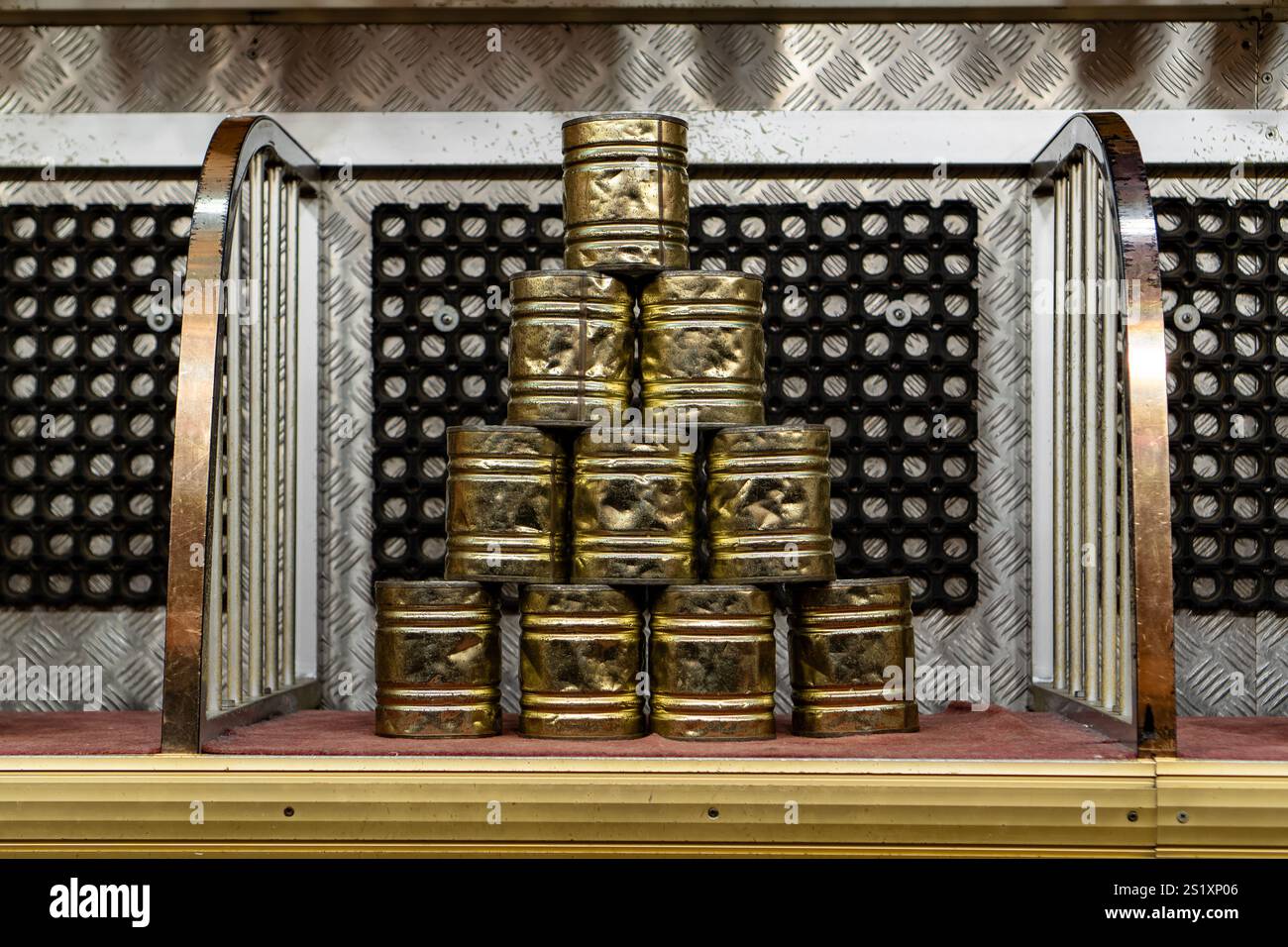 10 cans are stacked to throw a ball at at the funfair Stock Photo - Alamy
