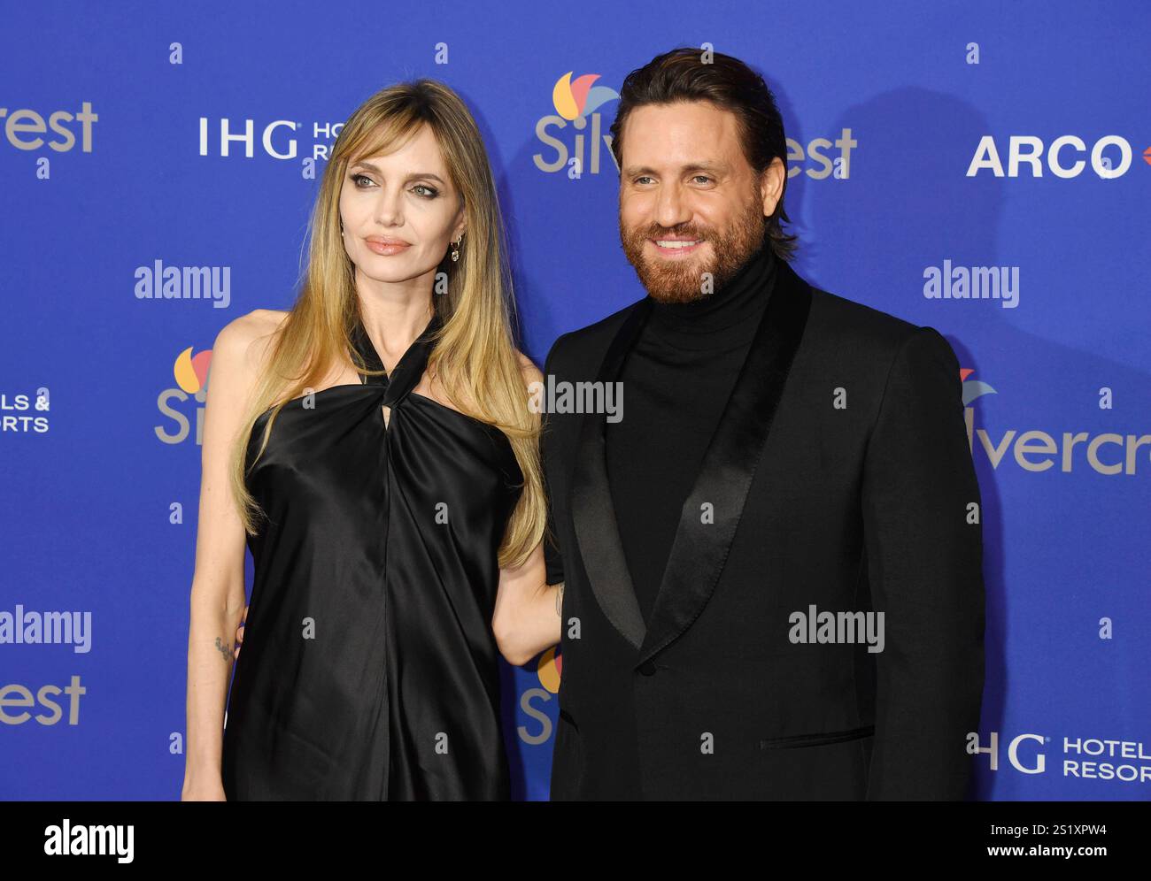 PALM SPRINGS, CALIFORNIA - JANUARY 03: (L-R) Angelina Jolie and Édgar ...