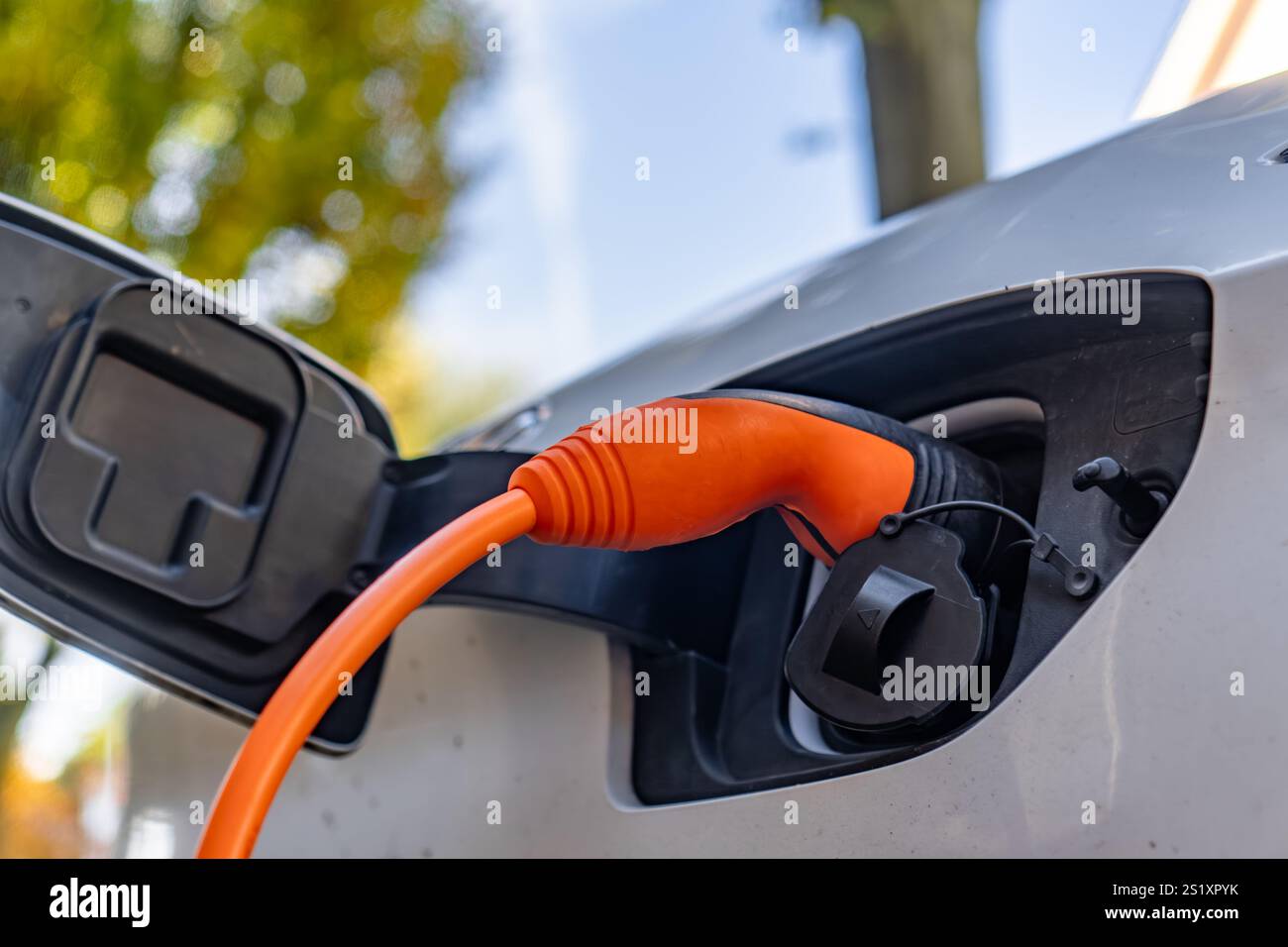 loading electrically powered car outdoors Stock Photo - Alamy