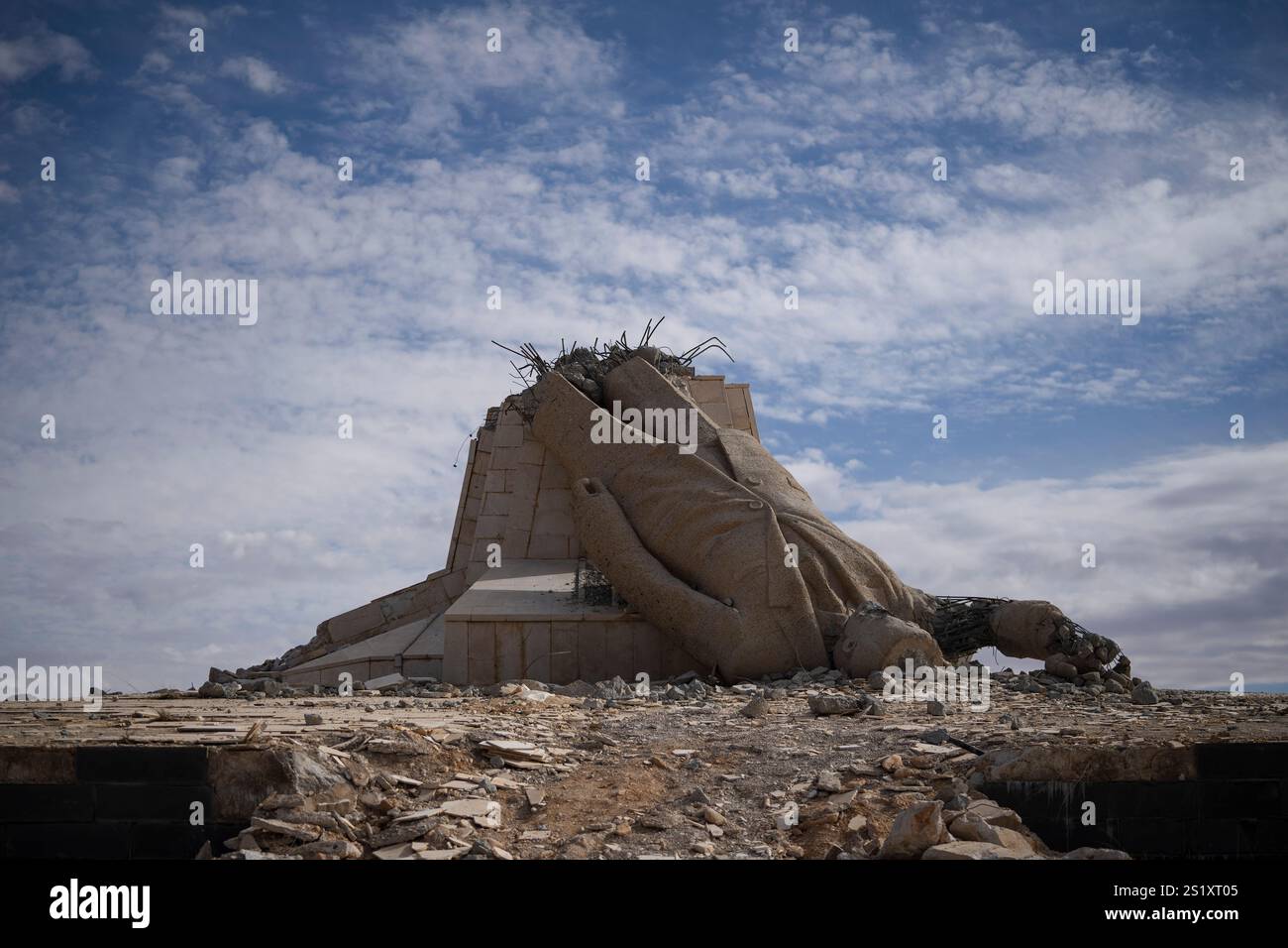 A statue depicting the late Syrian President Hafez Assad is seen ...