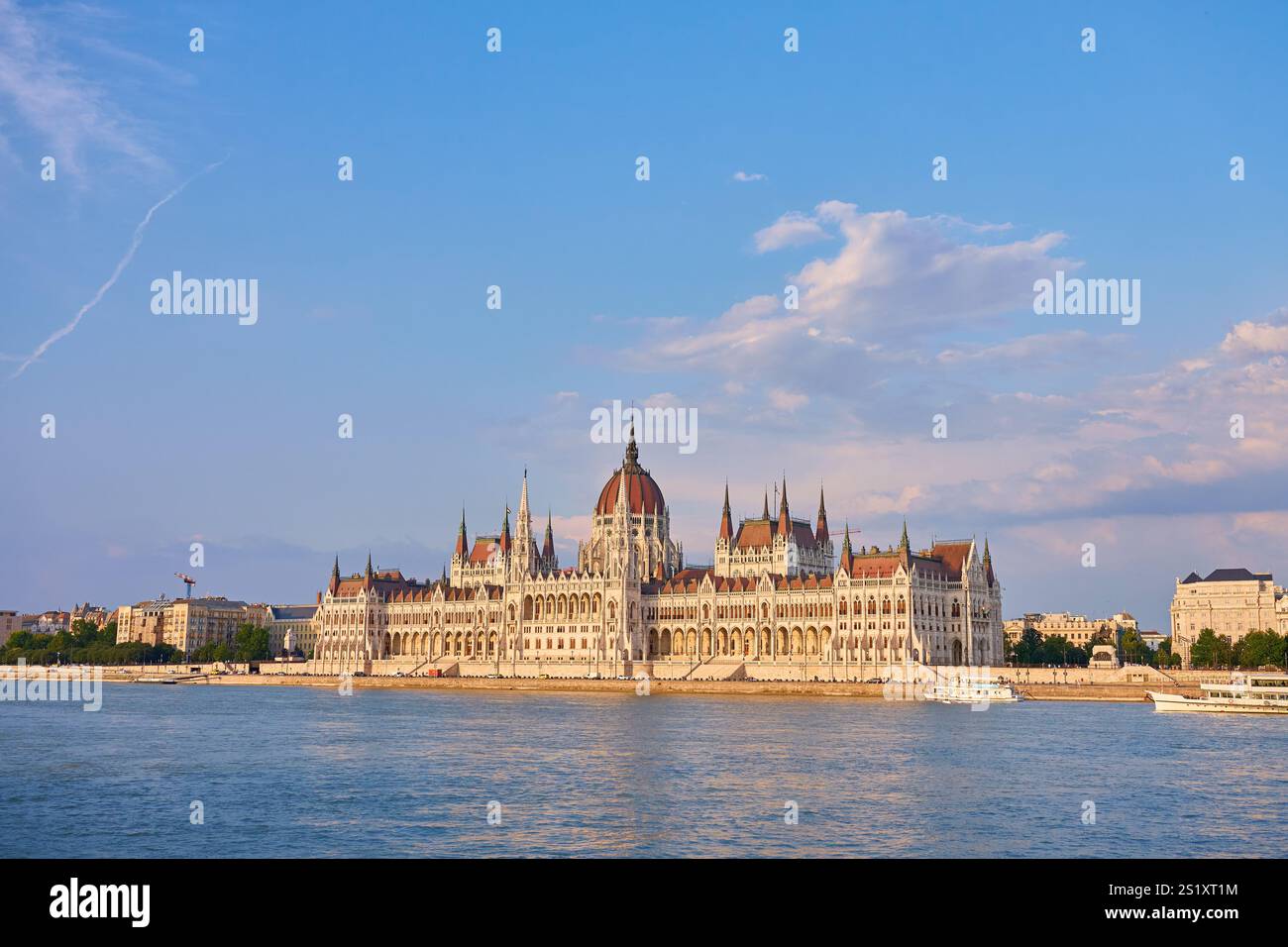 Parliament building along Danube river in Budapest, Hungary. Historical ...