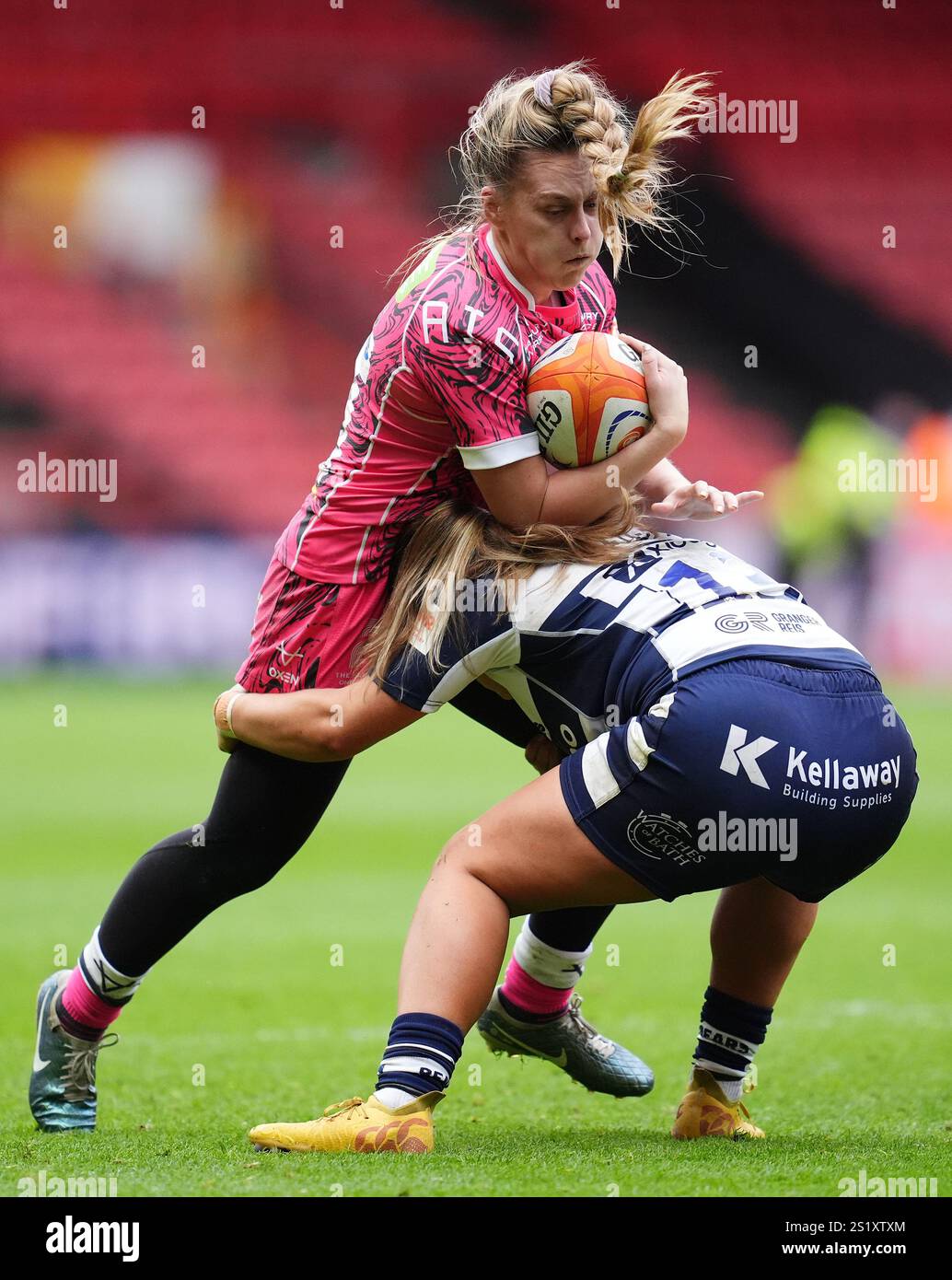 Gloucester-Hartpury's Hannah Jones (left) is tackled by Bristol Bears ...