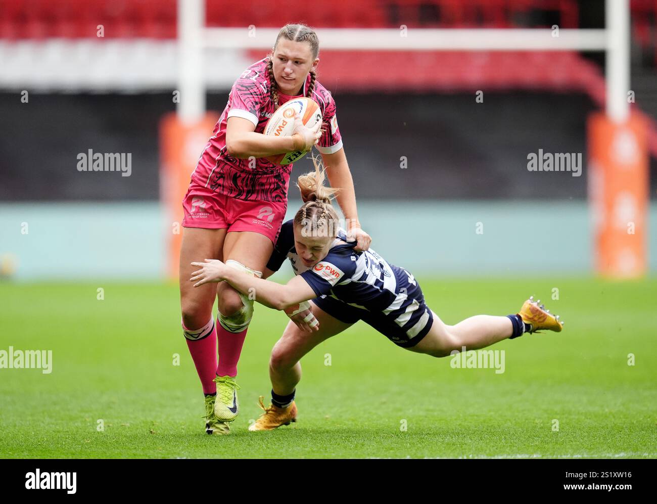 Gloucester-Hartpury's Emma Sing (left) is tackled by Bristol Bears ...