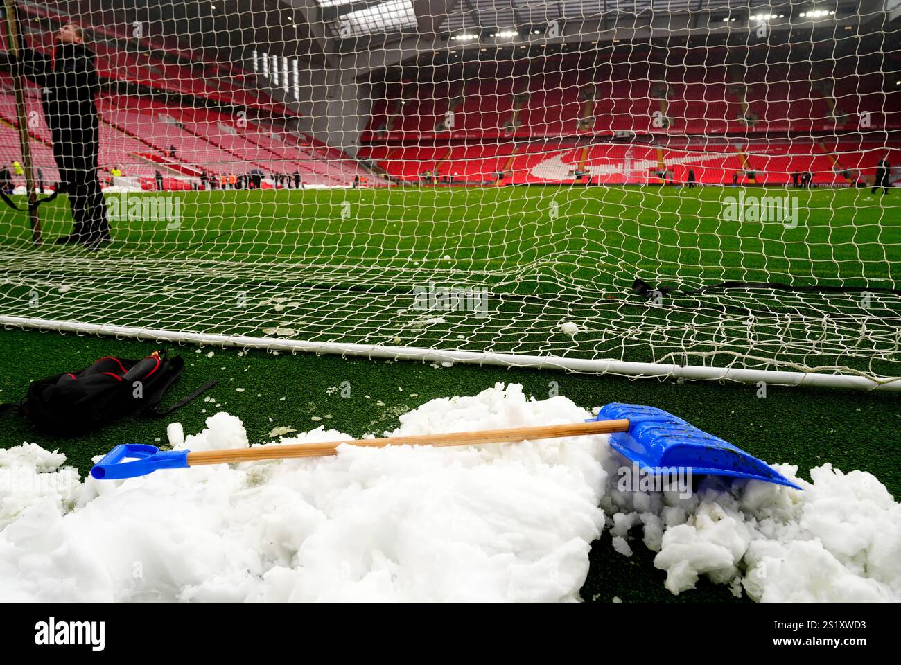 Snow and a shovel by the side of the pitch ahead of the Premier League ...