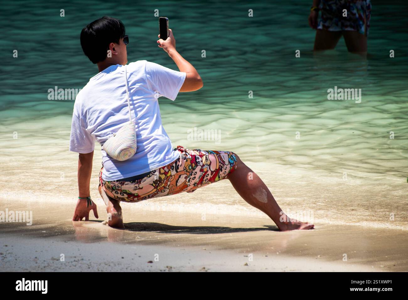 Tourists swarm Maya Bay’s iconic turquoise waters: a vibrant scene of ...