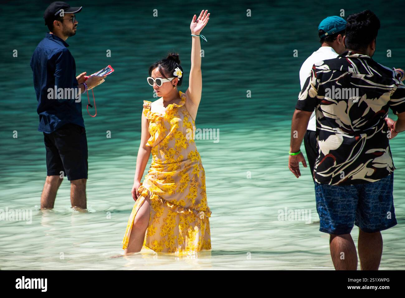 Tourists swarm Maya Bay’s iconic turquoise waters: a vibrant scene of ...
