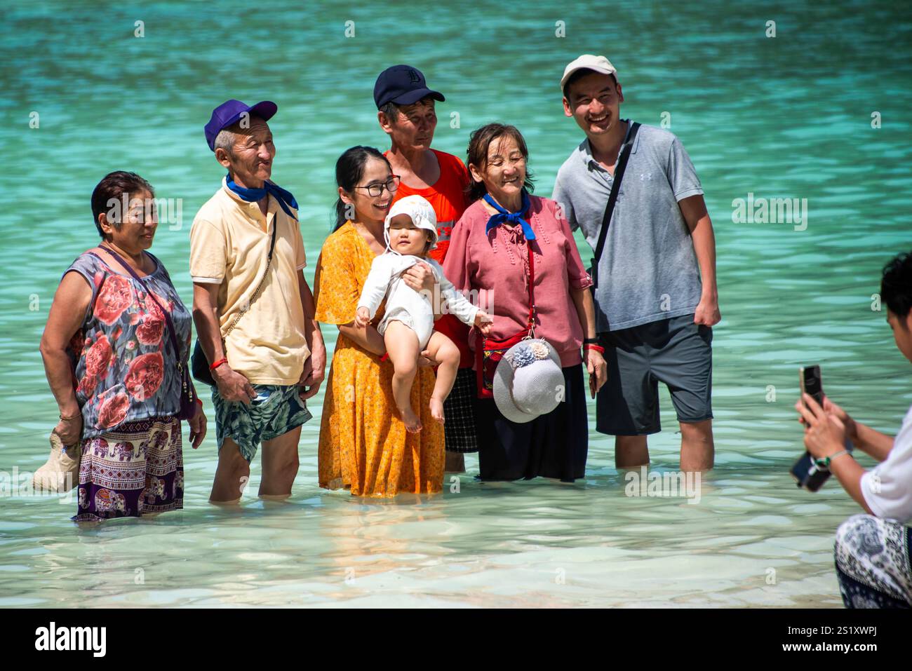 Tourists swarm Maya Bay’s iconic turquoise waters: a vibrant scene of ...